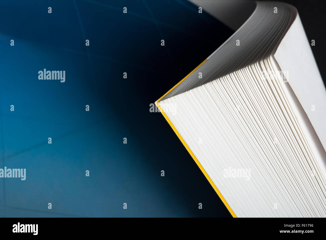 Close-up of curved book corner Stock Photo - Alamy