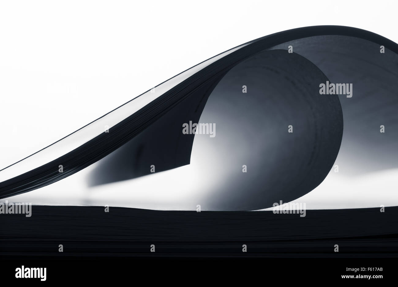 Paper sheets forming abstract curves Stock Photo - Alamy