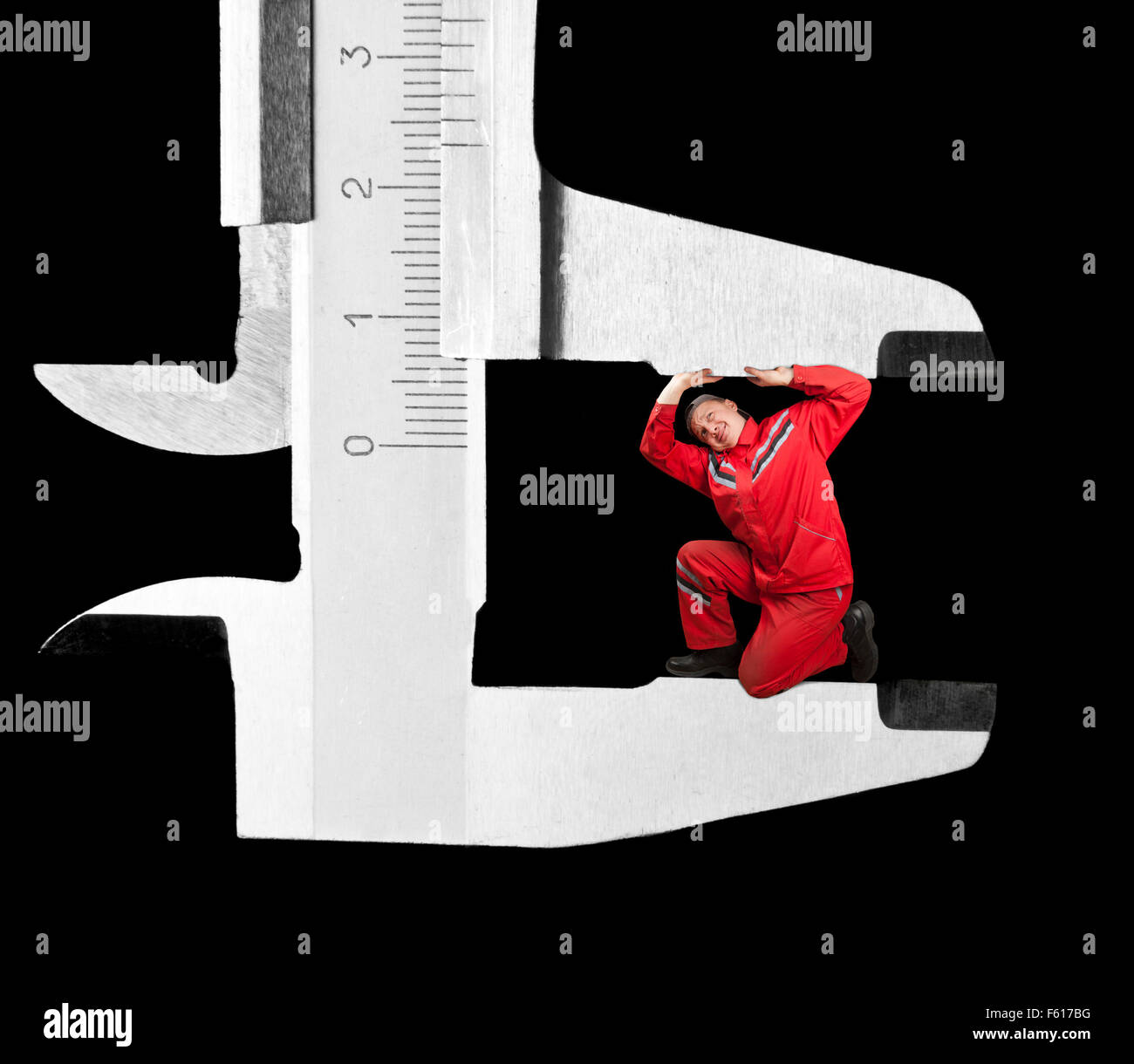 Chrome caliper measuring mechanic. Isolated on black Stock Photo - Alamy