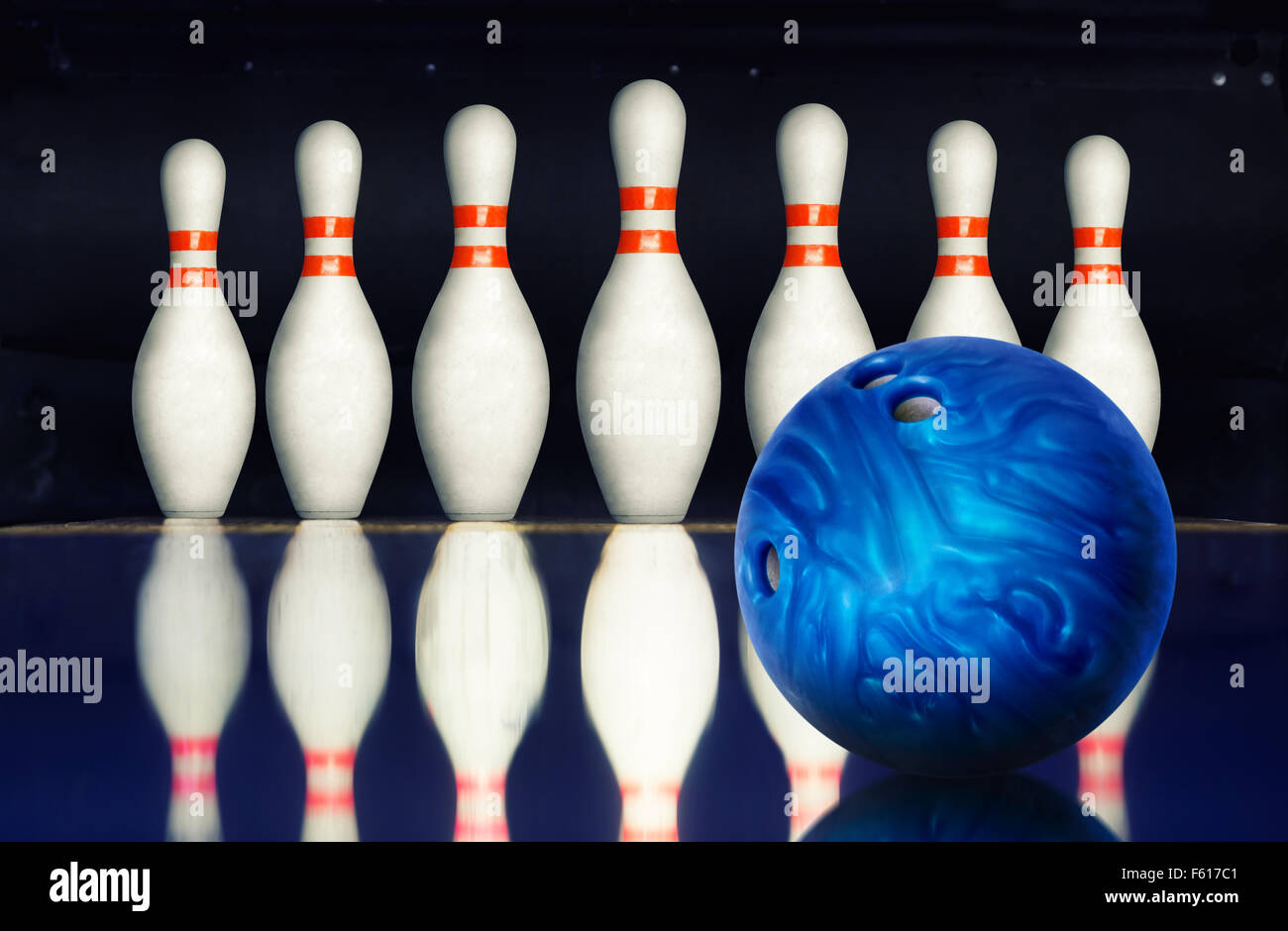 Bowling ball against ten pins Stock Photo - Alamy