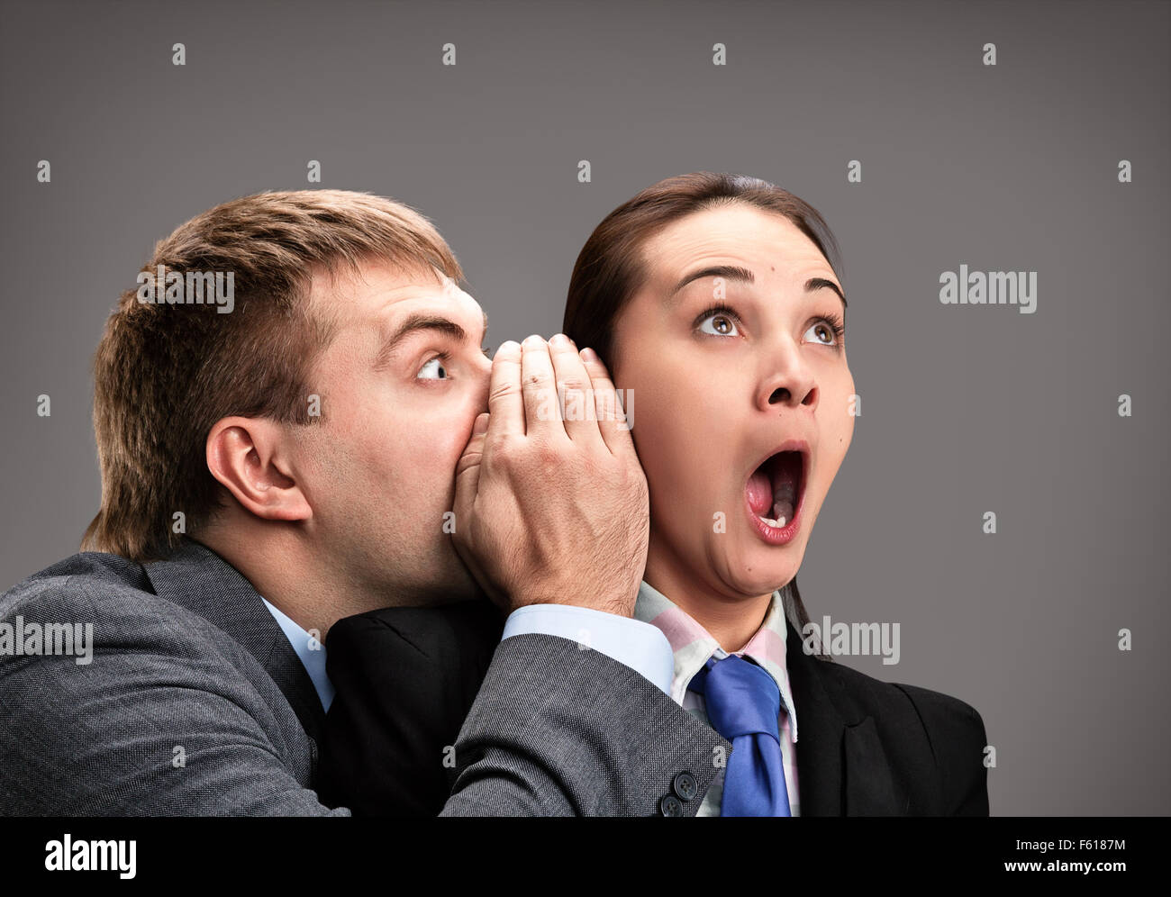 Whisper ear suit hi-res stock photography and images - Alamy