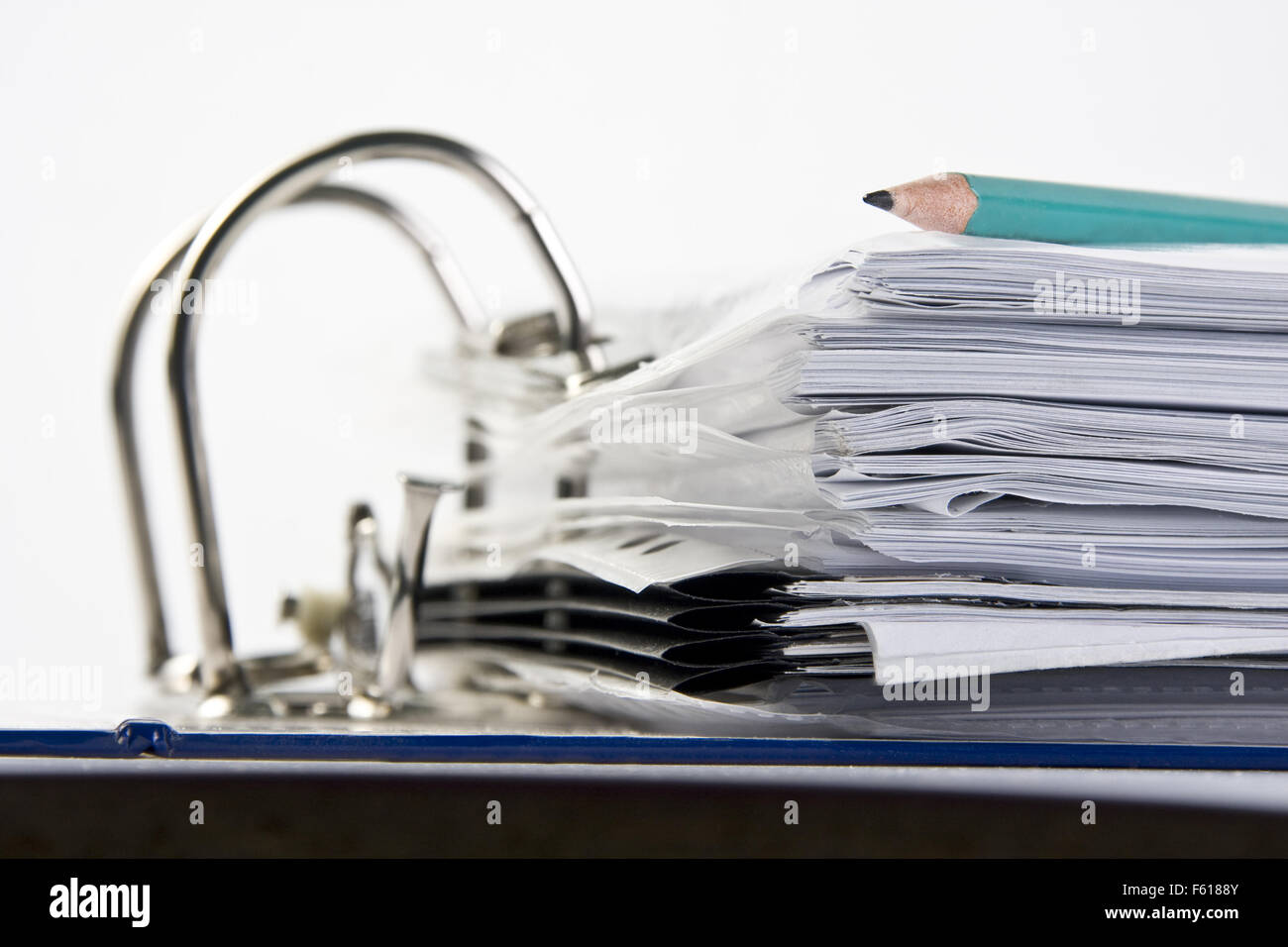 Binder with files and pencil Stock Photo - Alamy