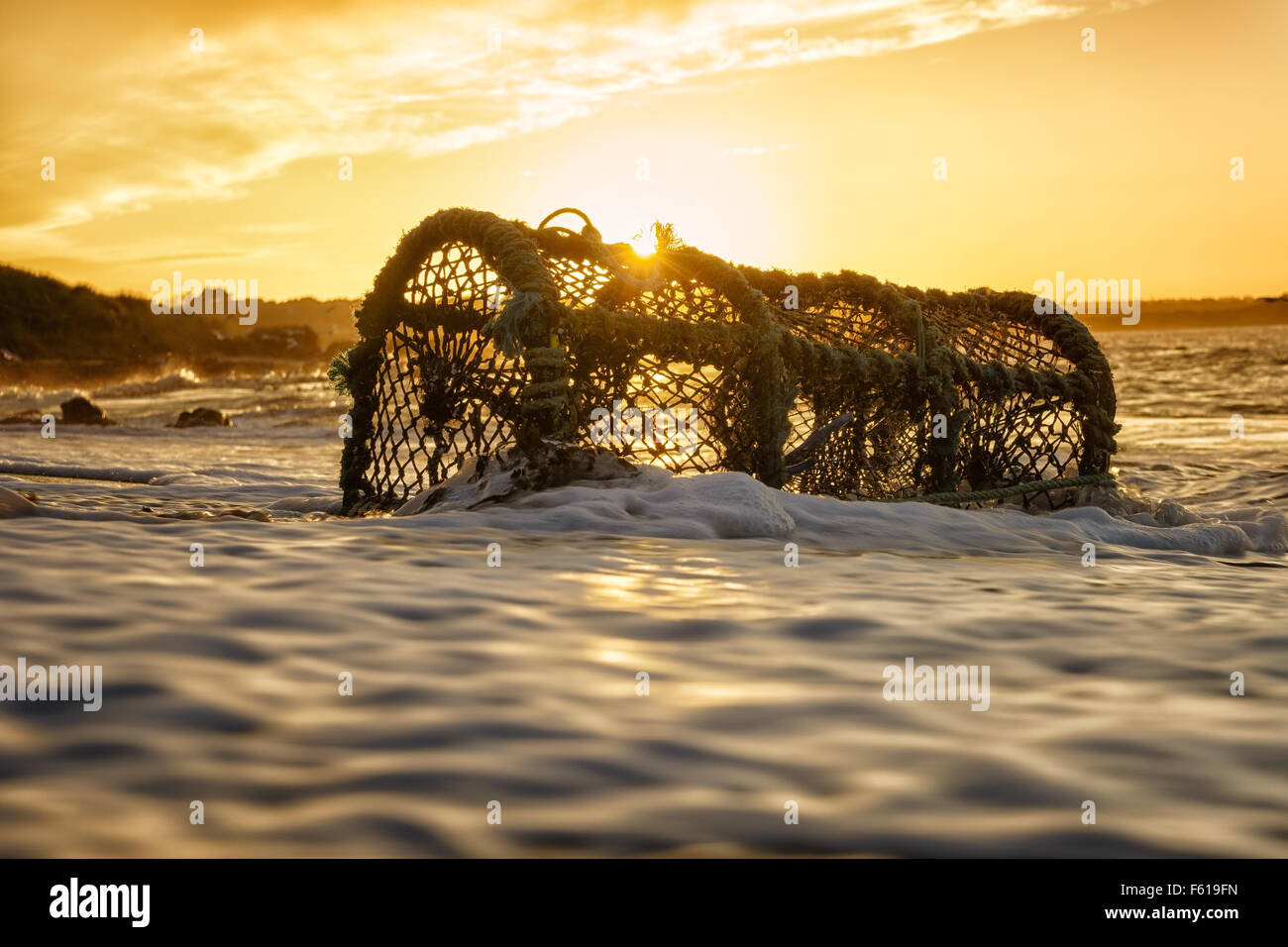 A lobster pot (creel) washed up on a beach in Scotland Stock Photo - Alamy
