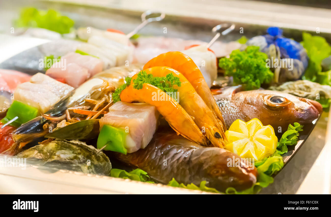 Tasty fish with shrimps close up Stock Photo - Alamy
