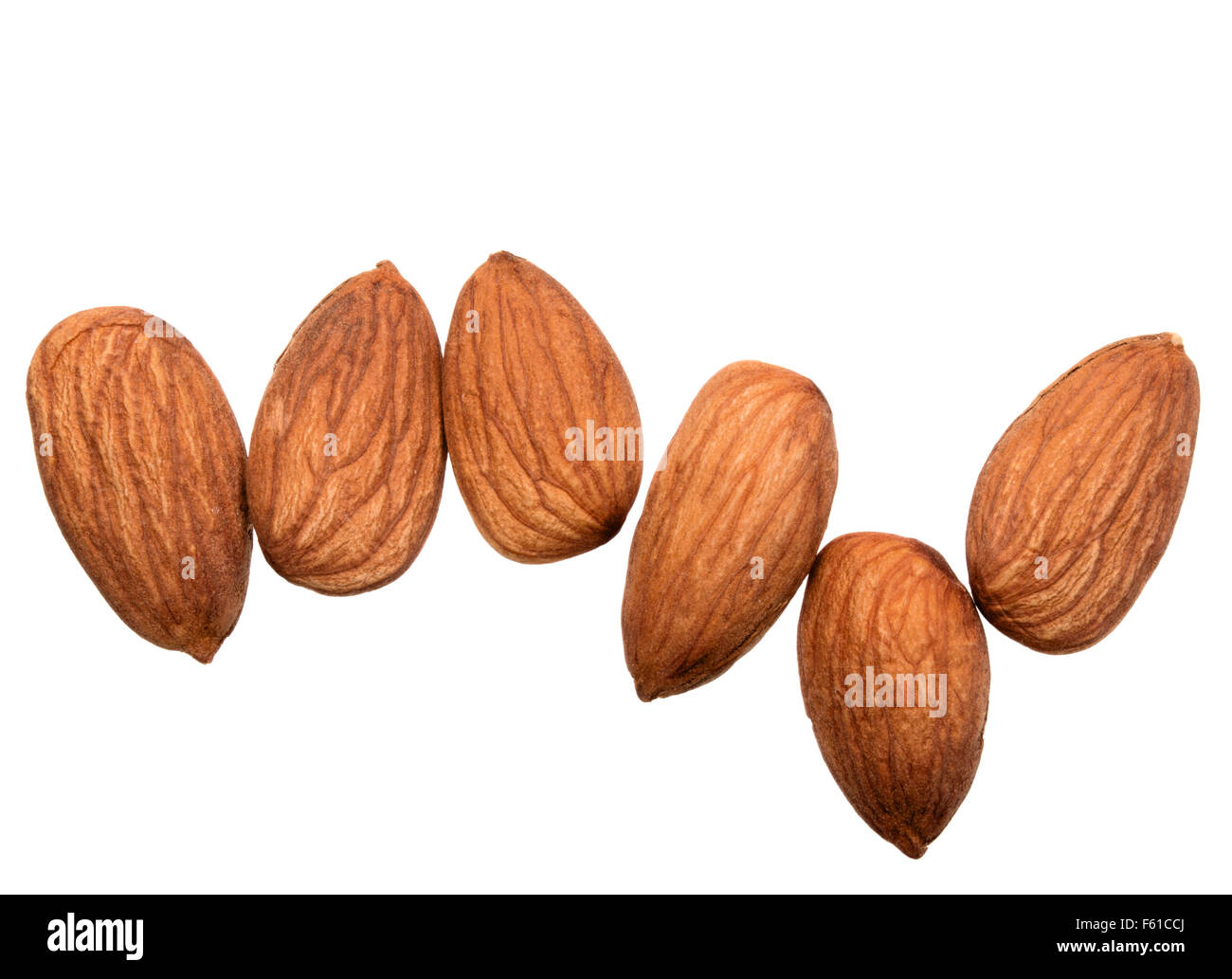 almond nuts isolated on white background close up Stock Photo - Alamy