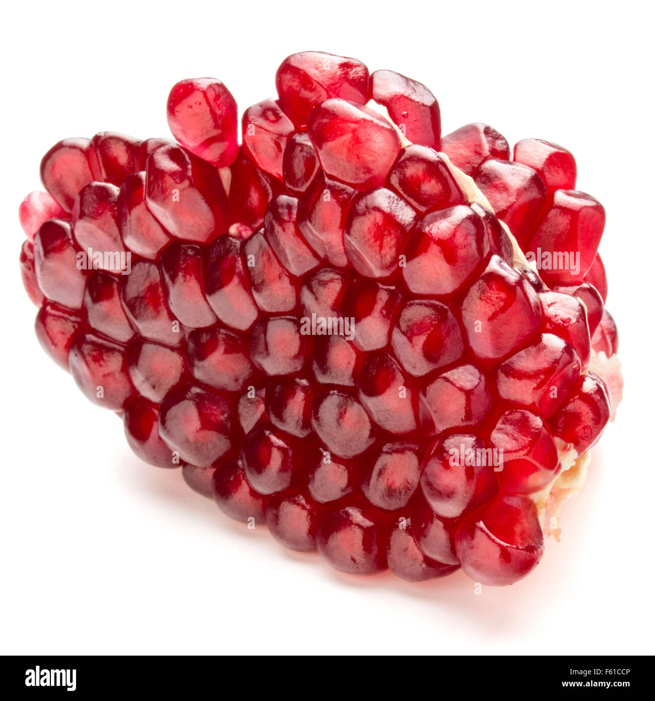 Ripe pomegranate fruit segment isolated on white background cutout ...