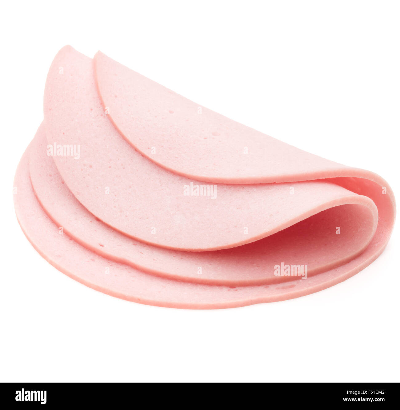 cooked boiled ham sausage or rolled bologna slices isolated on white ...