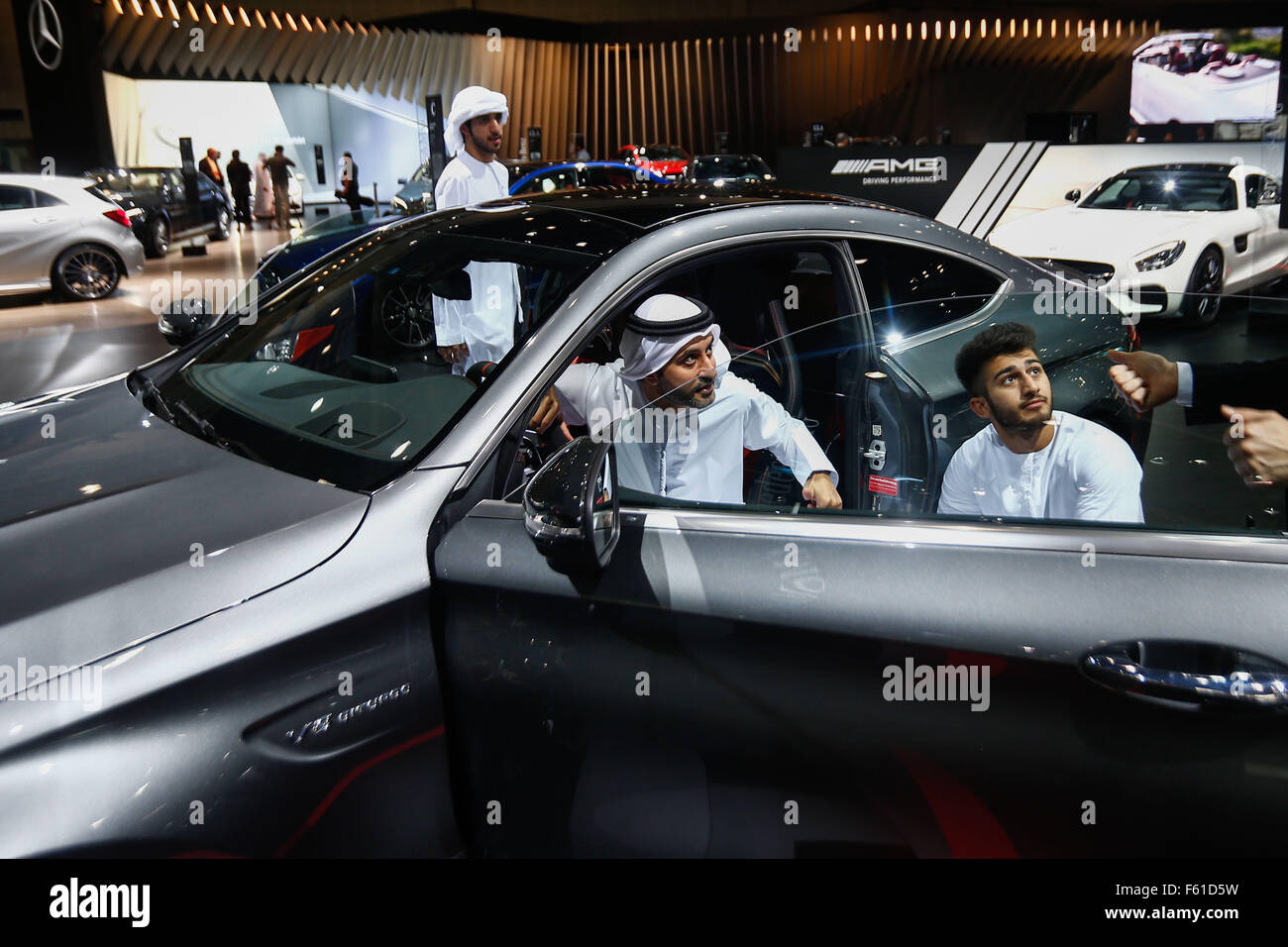Dubai, United Arab Emirates. 10th Nov, 2015. An Arab customer sits ...