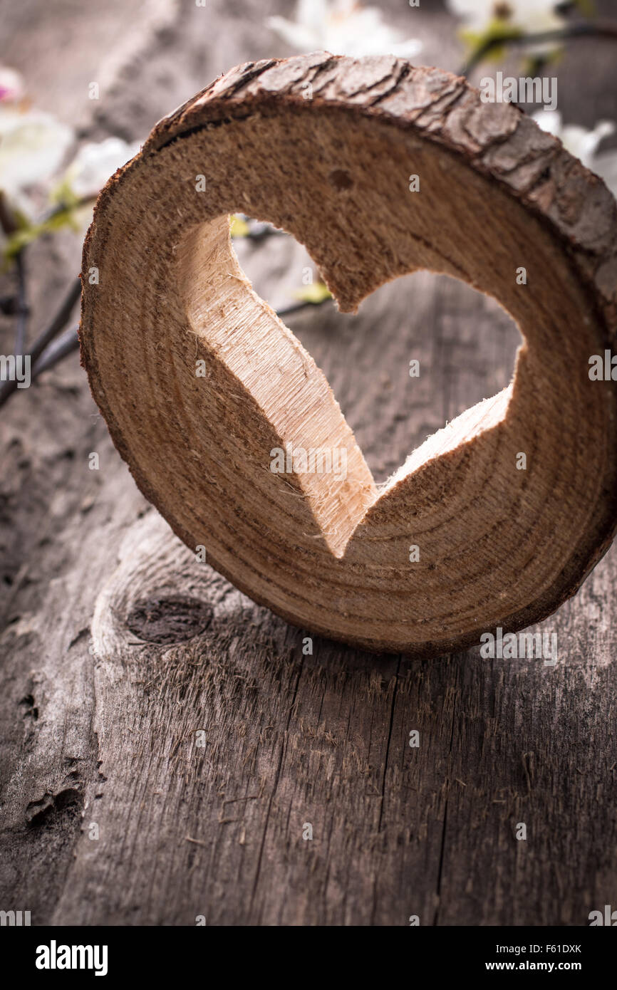 Light heart on rustic wooden background Stock Photo - Alamy