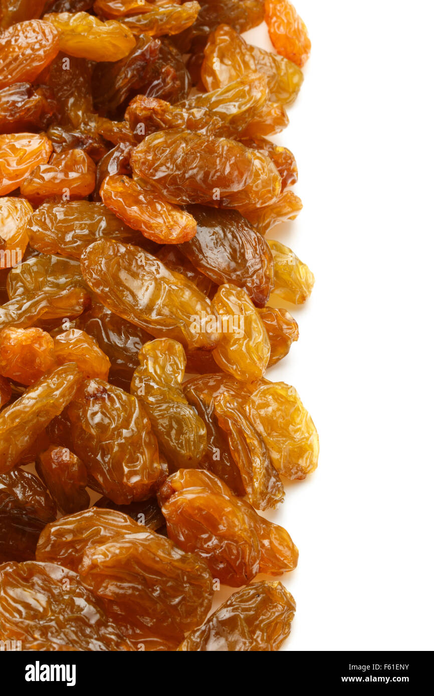 Yellow sultanas raisins isolated on white background cutout Stock Photo - Alamy