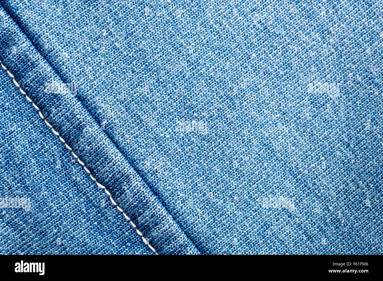 A closeup of jeans fabric with seam Stock Photo - Alamy