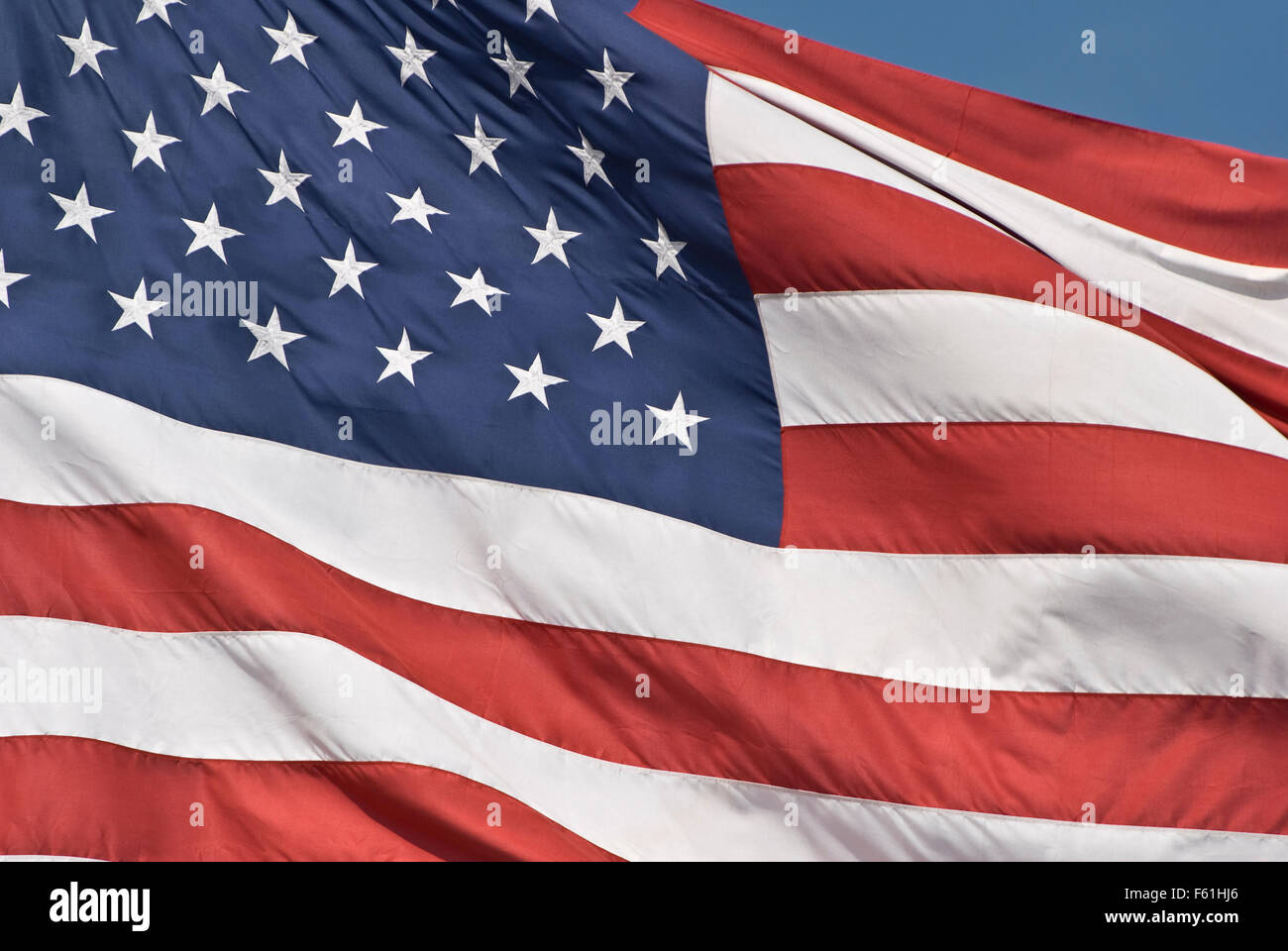 American flag waving in the breeze wind hi-res stock photography and ...
