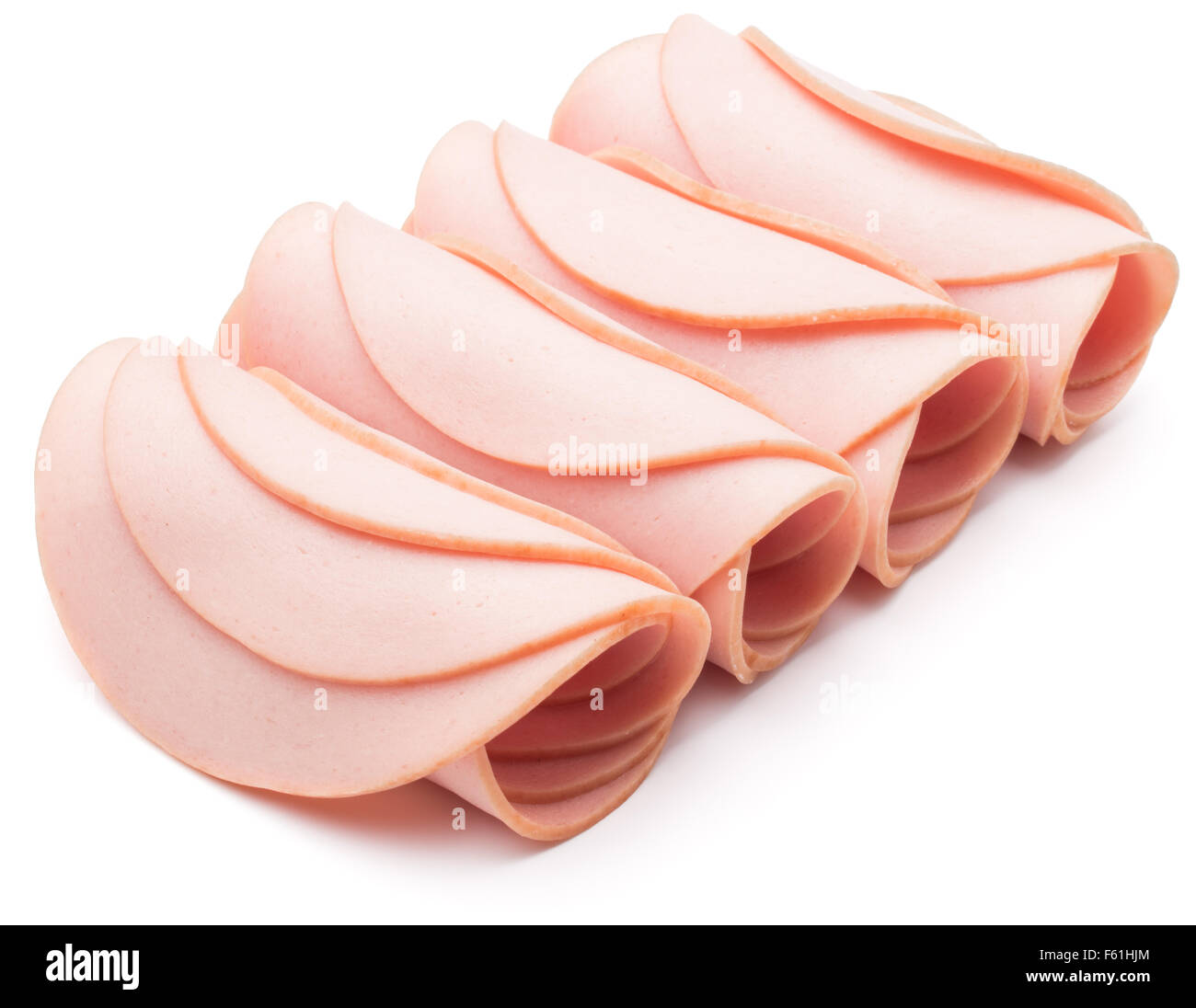 cooked boiled ham sausage or rolled bologna slices isolated on white ...