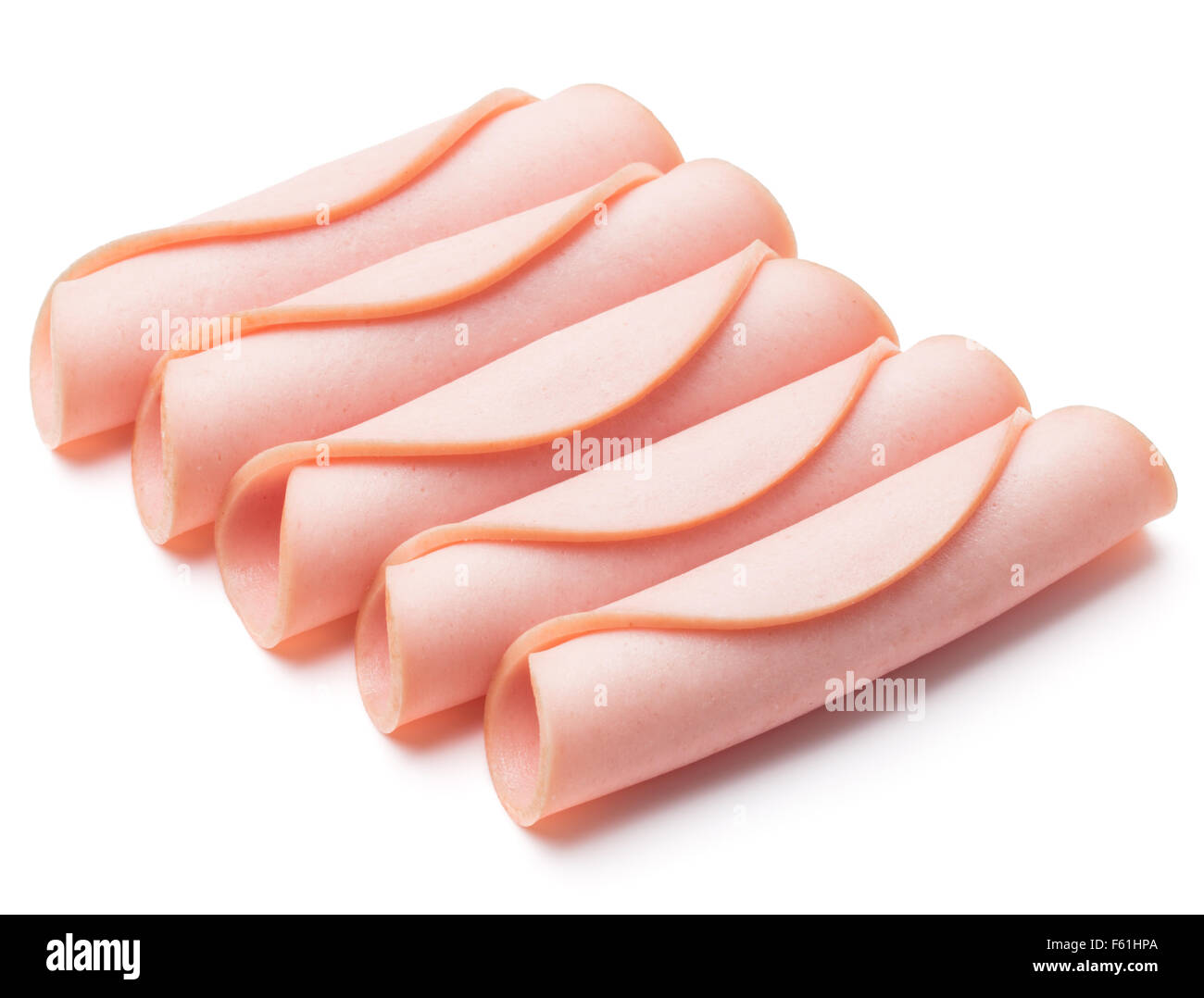 cooked boiled ham sausage or rolled bologna slices isolated on white ...