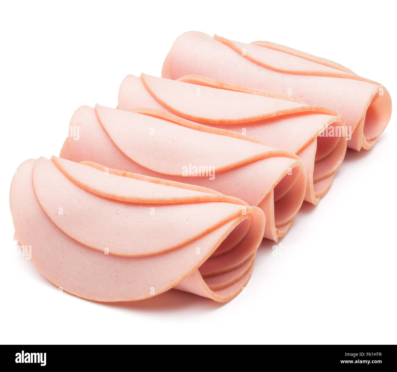 cooked boiled ham sausage or rolled bologna slices isolated on white ...