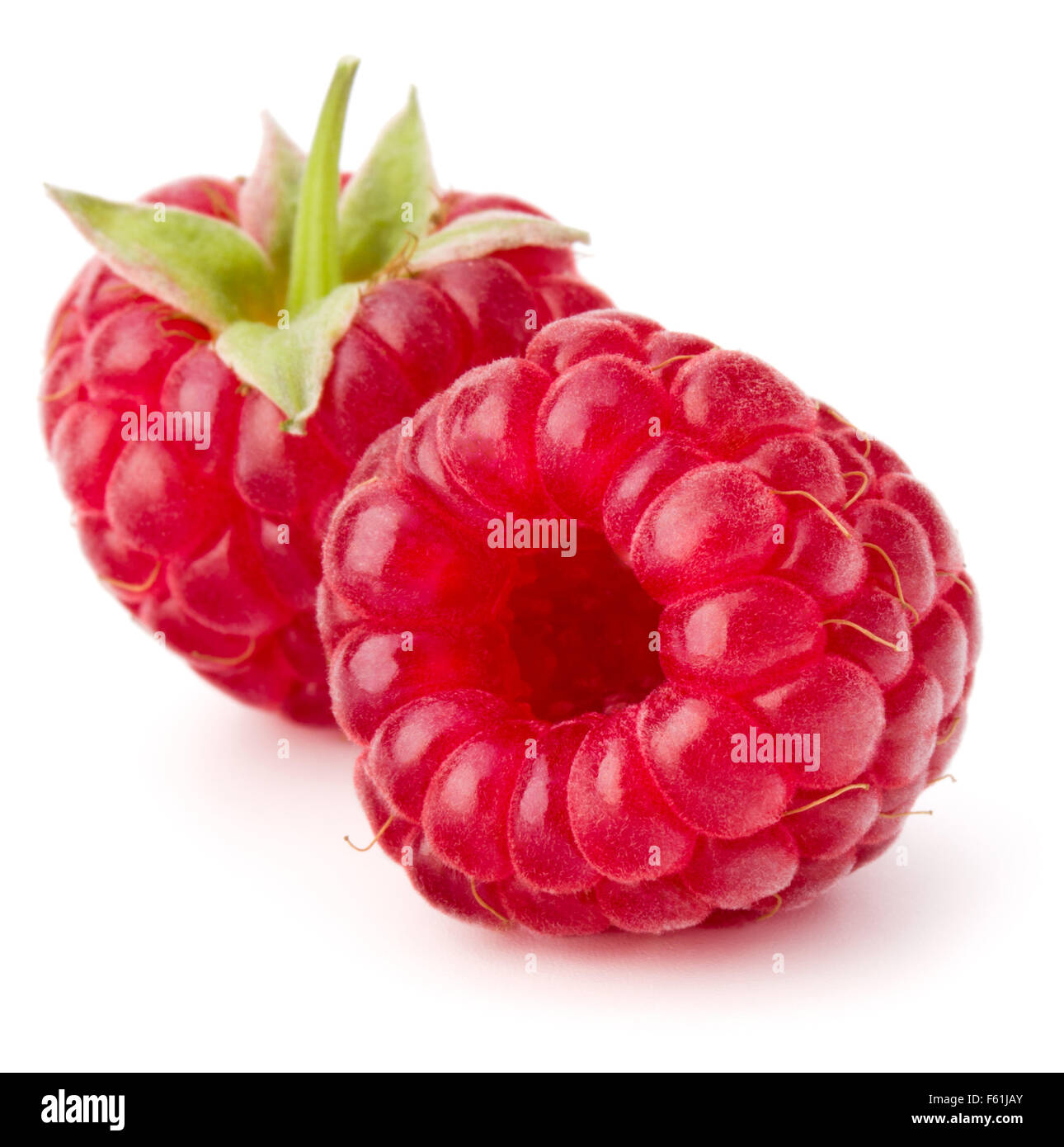 ripe raspberries isolated on white background close up Stock Photo - Alamy