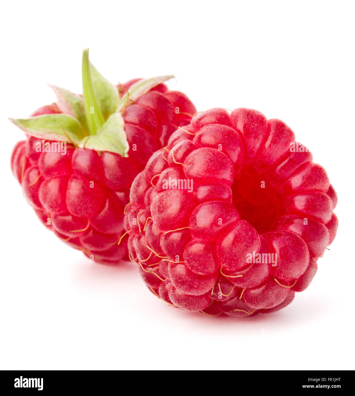 ripe raspberries isolated on white background close up Stock Photo - Alamy