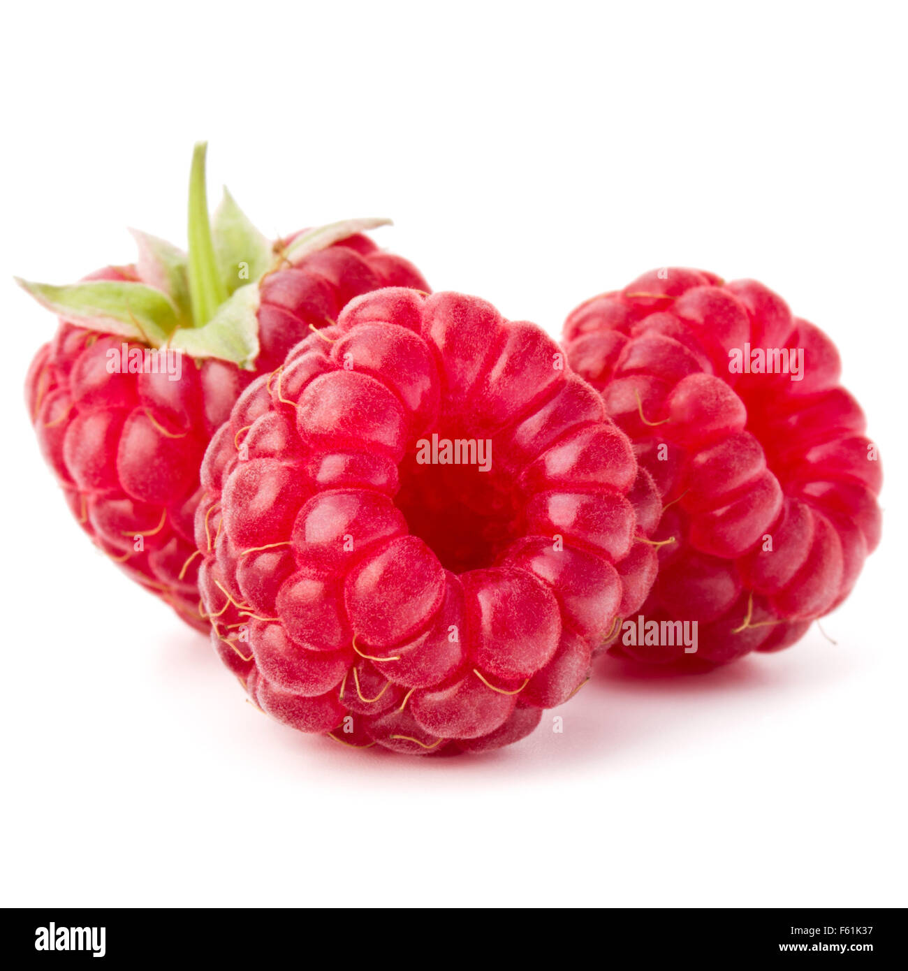 ripe raspberries isolated on white background close up Stock Photo - Alamy