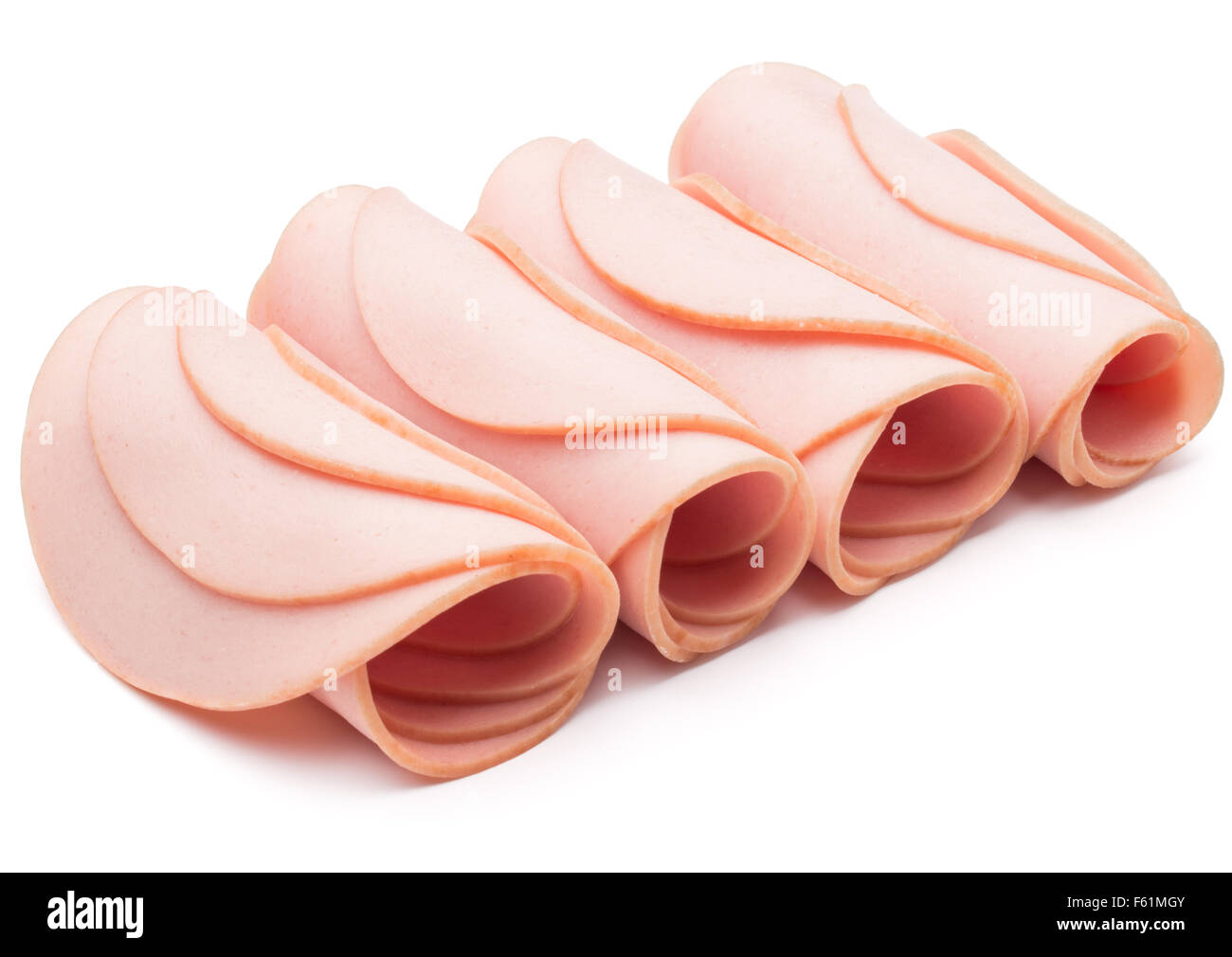 cooked boiled ham sausage or rolled bologna slices isolated on white ...