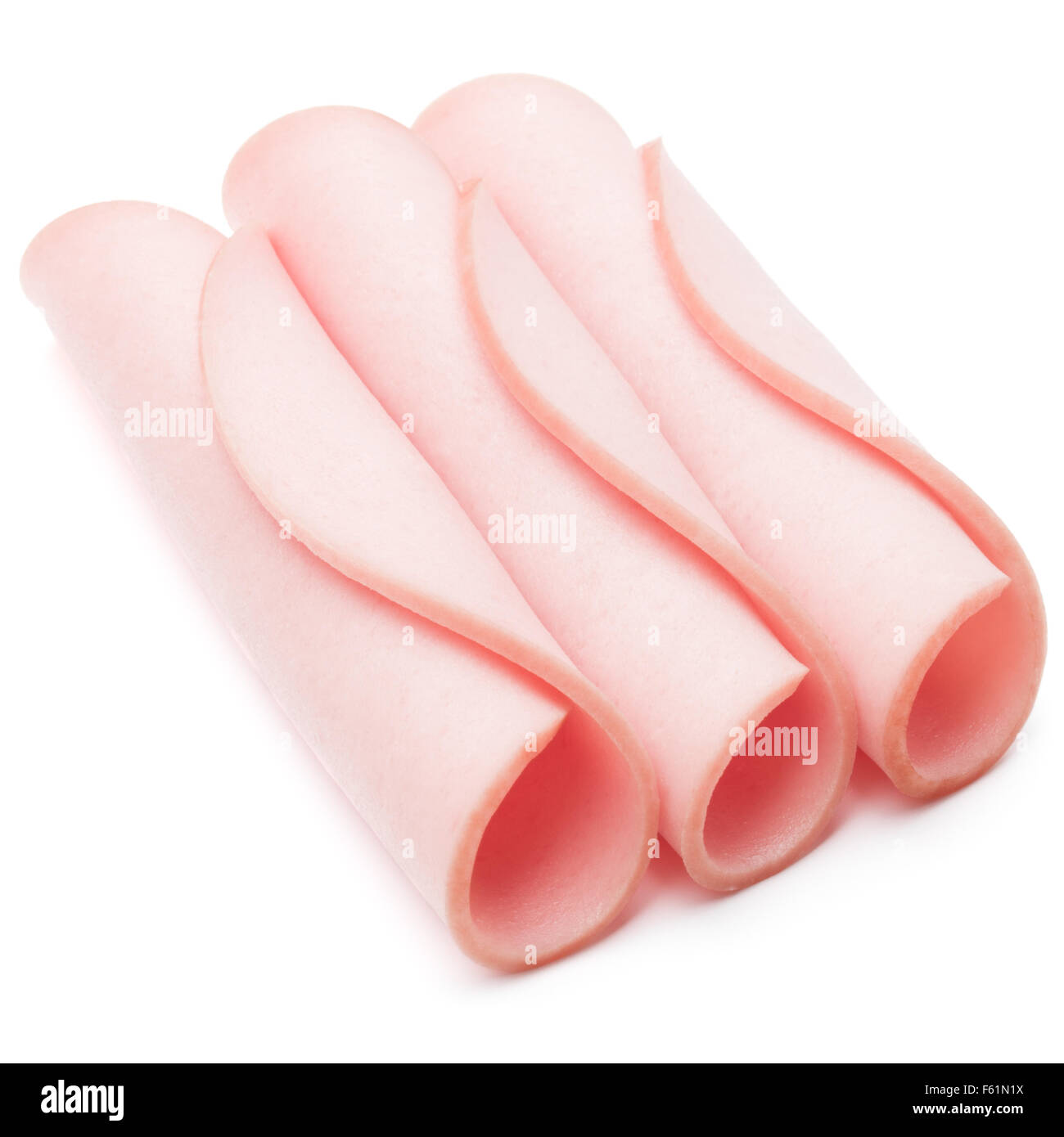 cooked boiled ham sausage or rolled bologna slices isolated on white ...