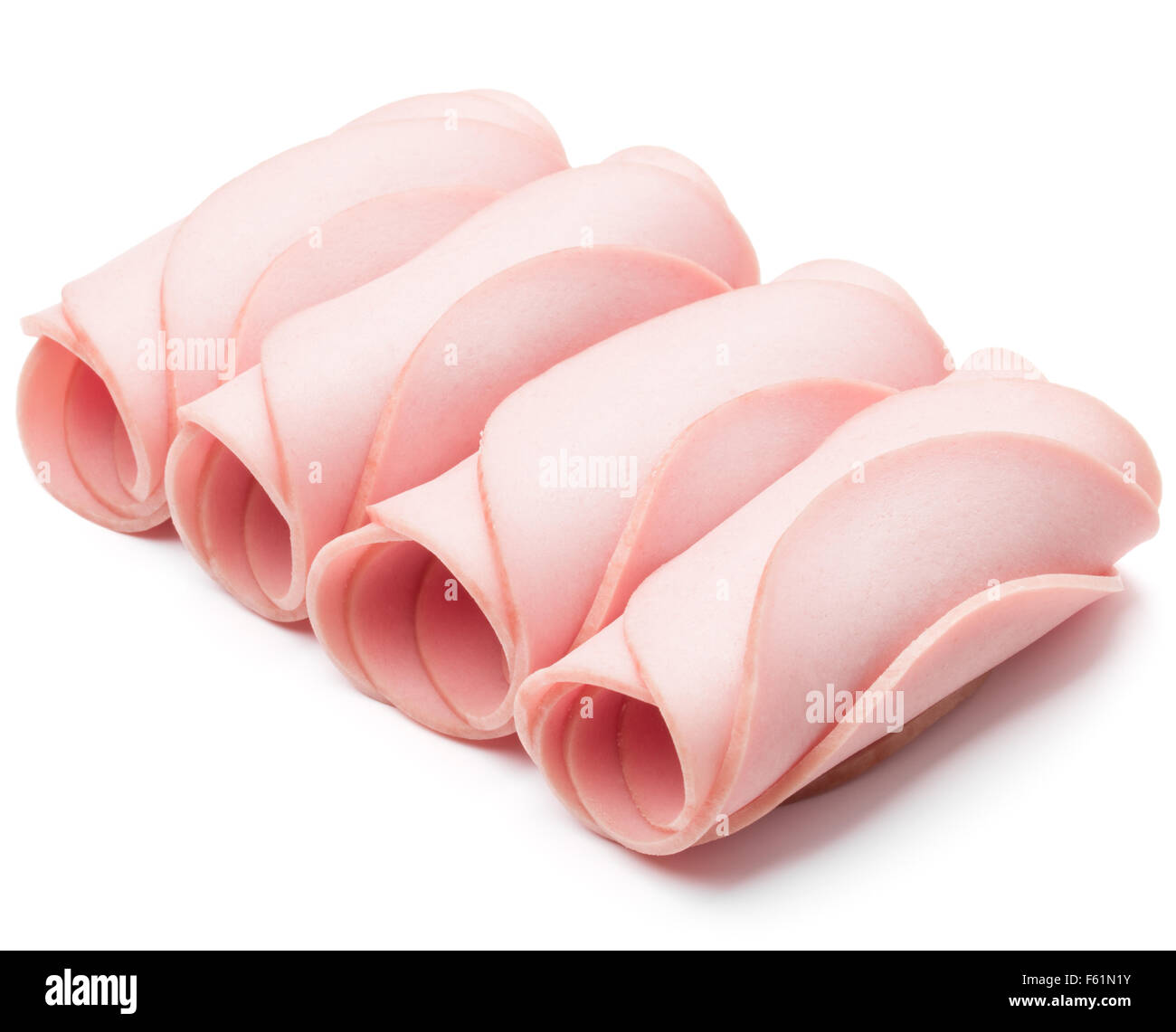 cooked boiled ham sausage or rolled bologna slices isolated on white ...