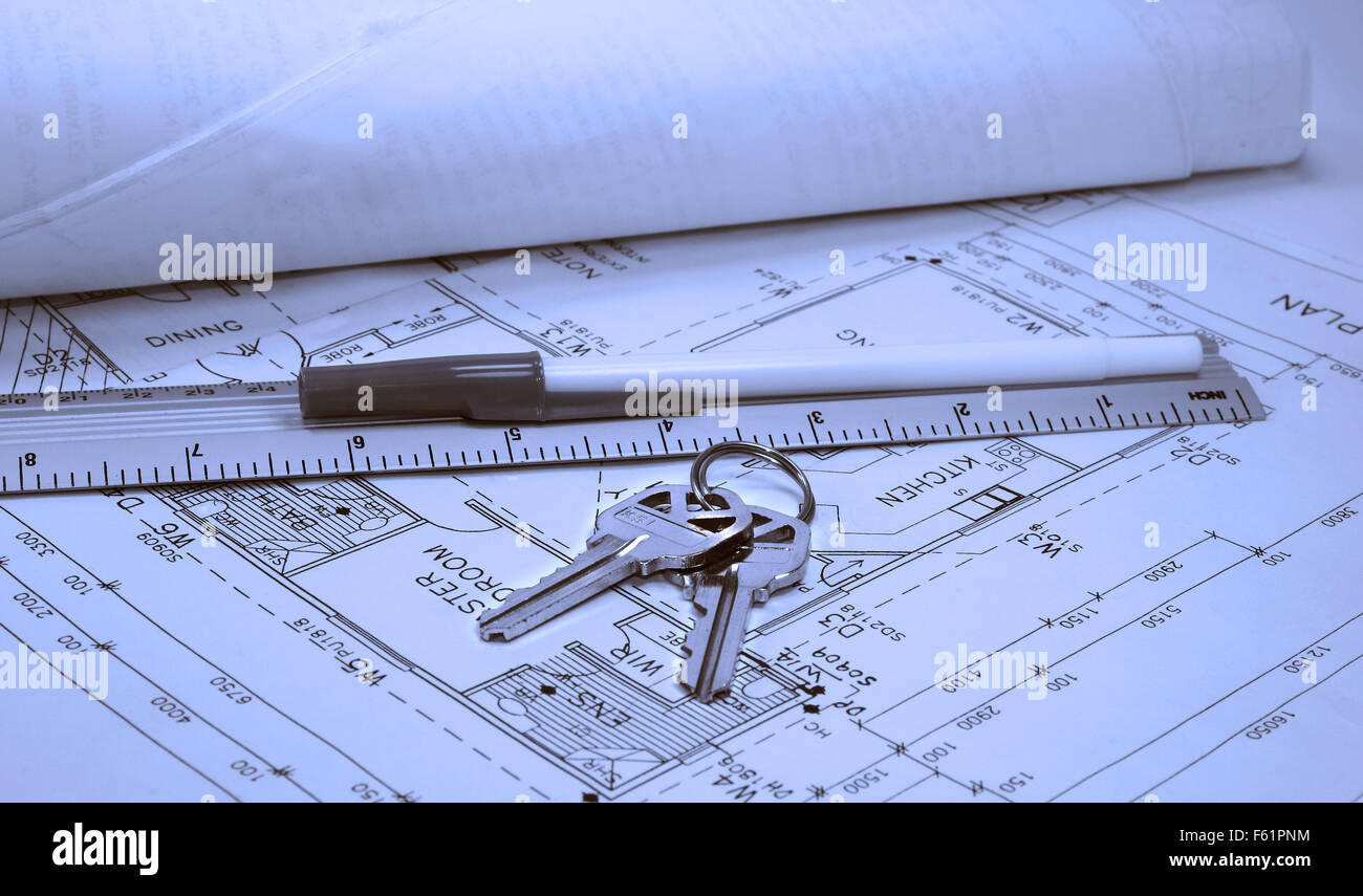 architect drawn plans with keys to property Stock Photo - Alamy