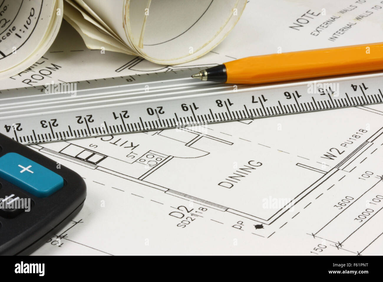 house plans with ruler pen and calculator Stock Photo - Alamy