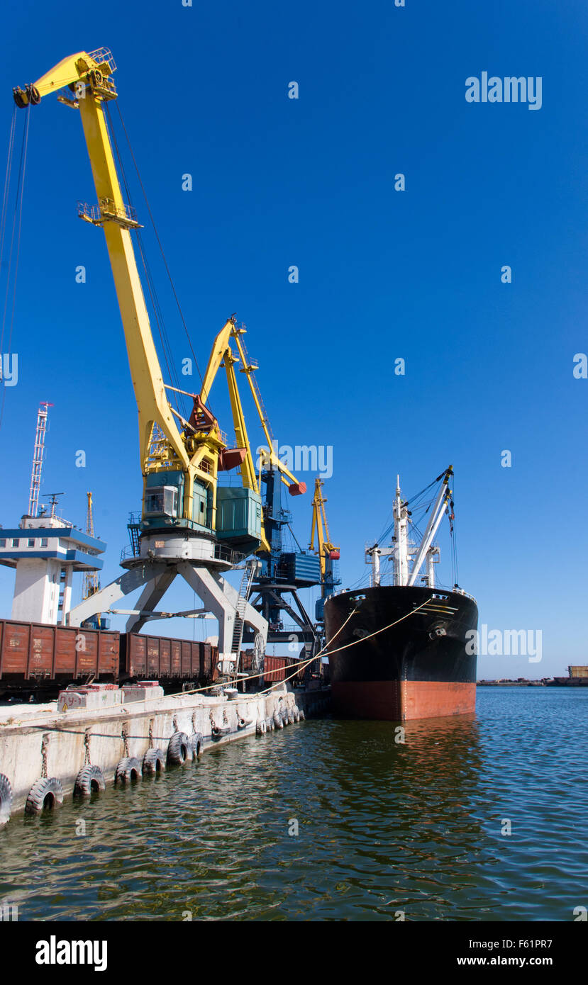 cargo ship on loading in sea port of Mariupol Stock Photo - Alamy