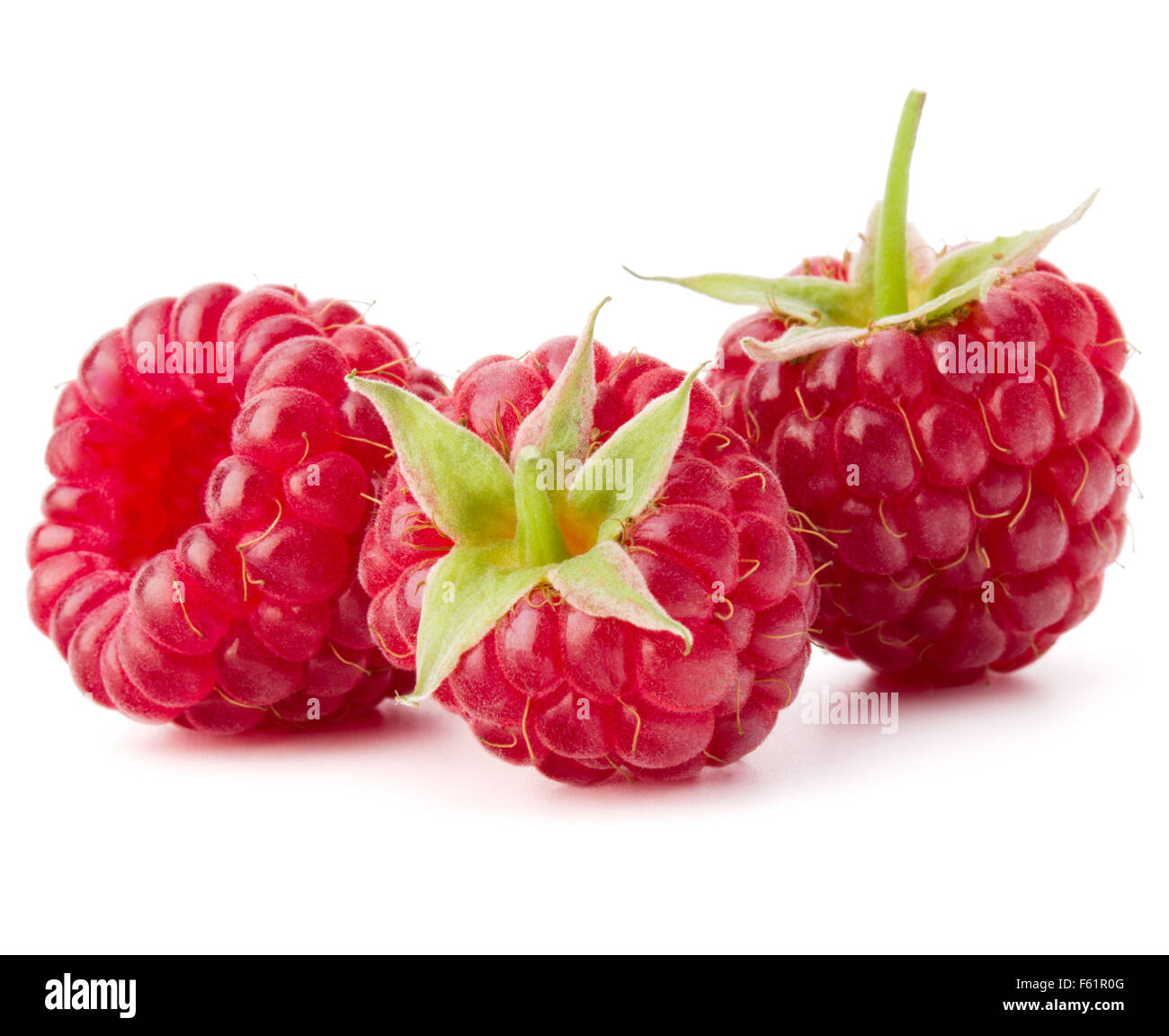 ripe raspberries isolated on white background close up Stock Photo - Alamy