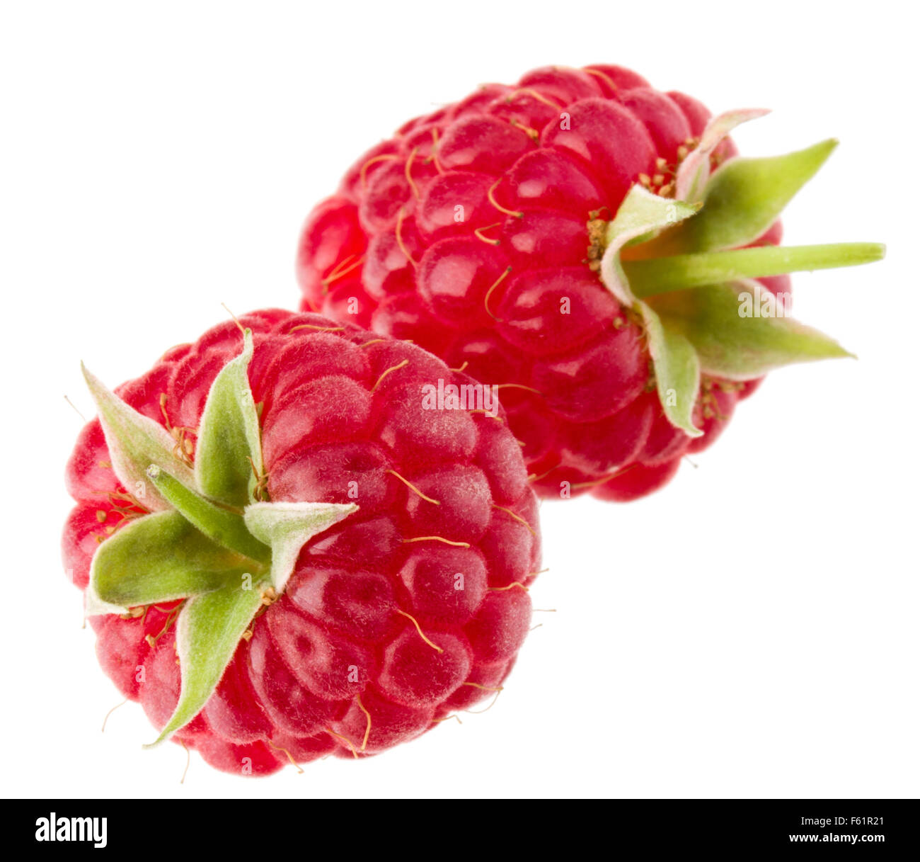 ripe raspberries isolated on white background close up Stock Photo - Alamy