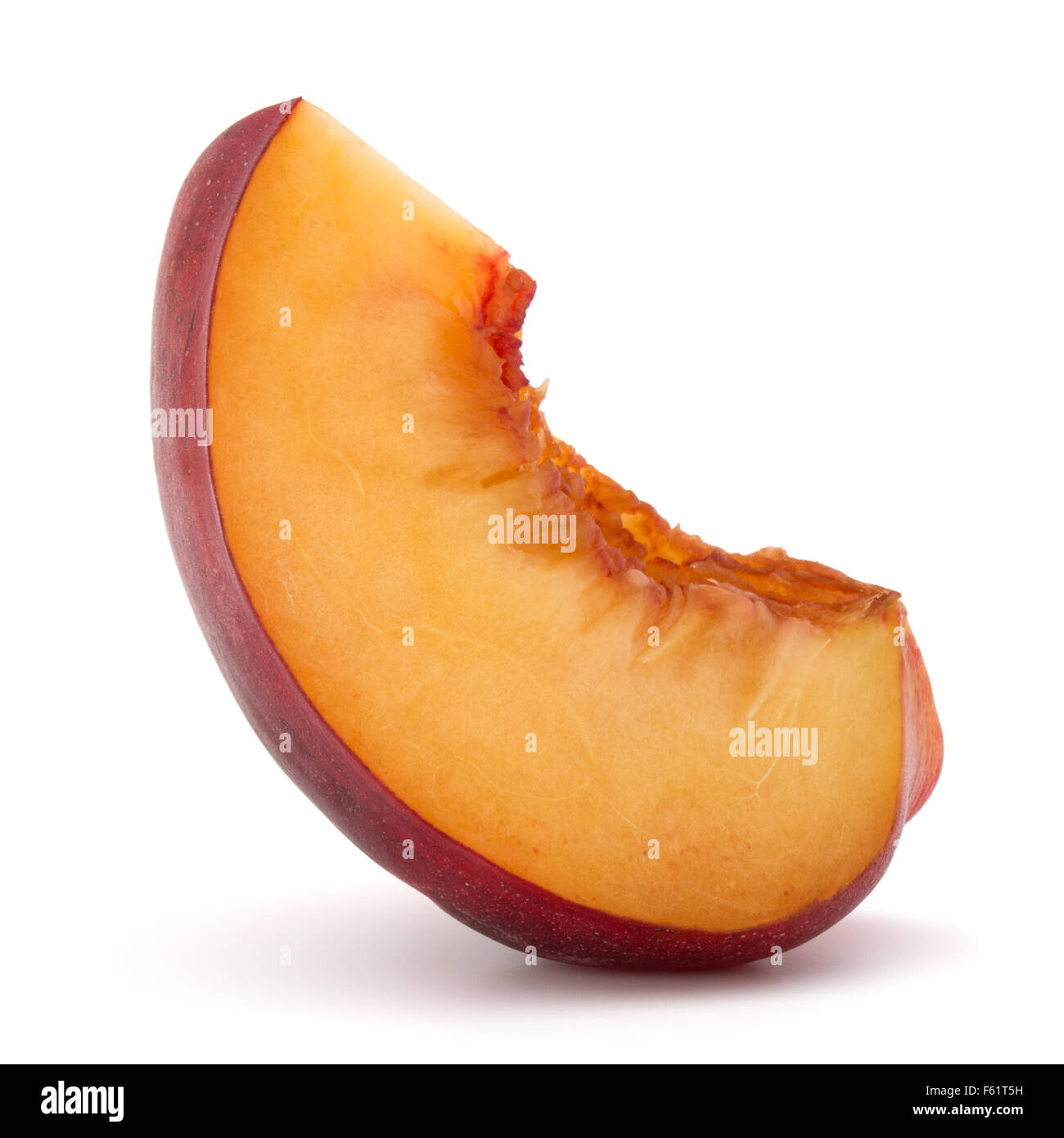 Nectarine fruit slice isolated on white background close up Stock Photo ...