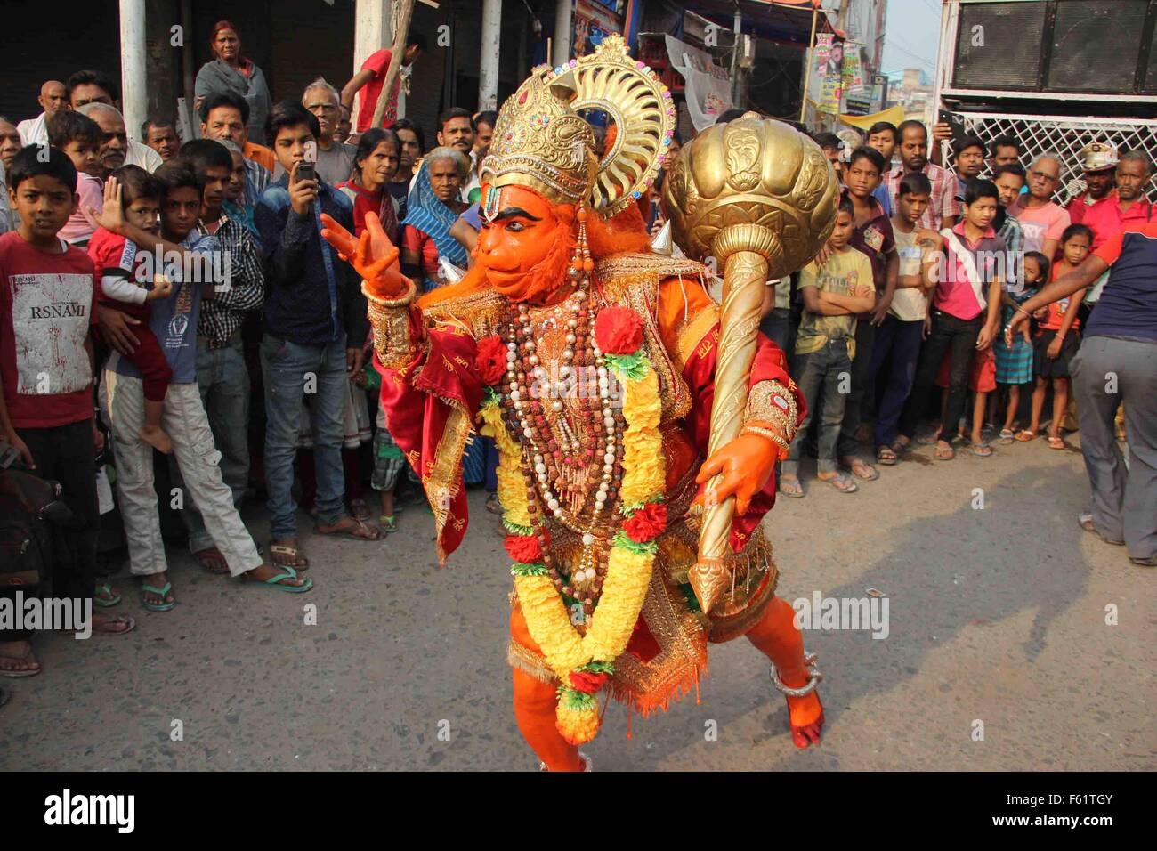 India. 10th Nov, 2015. A devotee dressed as a monkey God Lord Hanuman ...