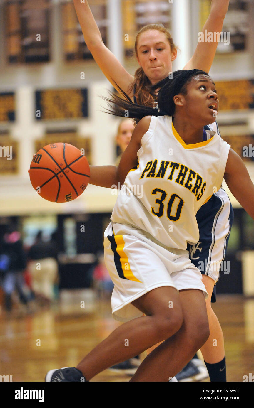 Player in the process of finishing off a baseline drive that resulted ...