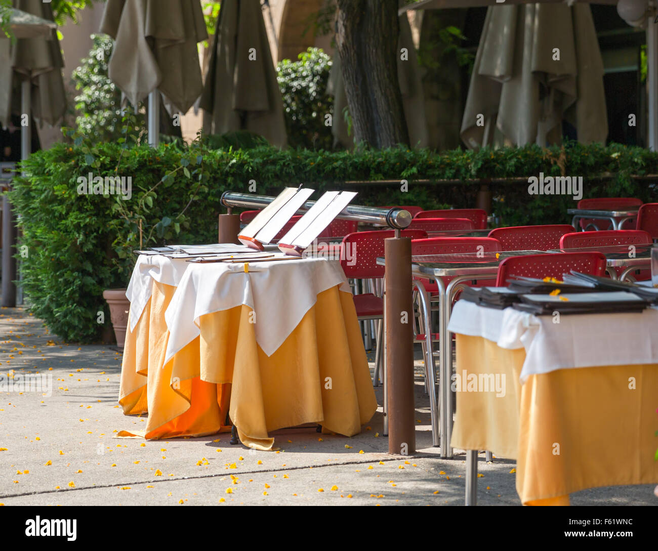 Restaurant tables on old european square Stock Photo - Alamy