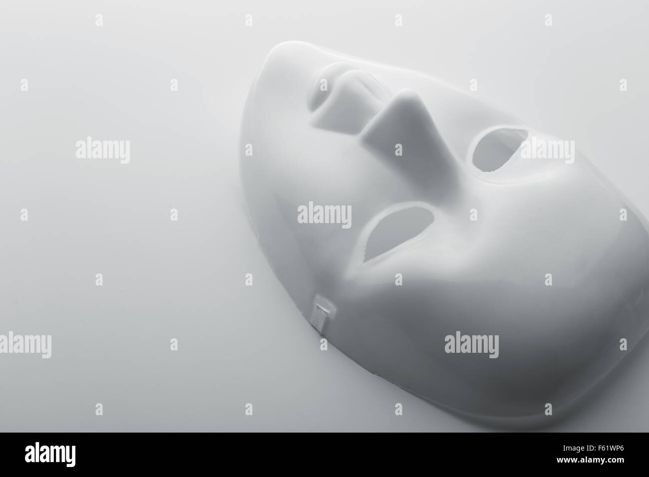 Closeup of white face mask Stock Photo - Alamy