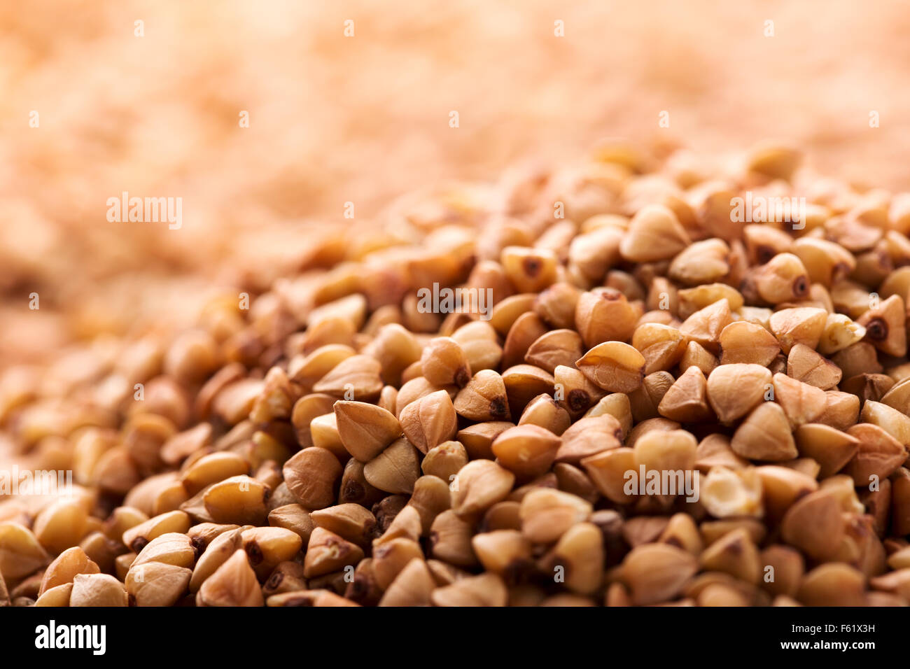 Heap of buckwheat. Closeup view Stock Photo - Alamy