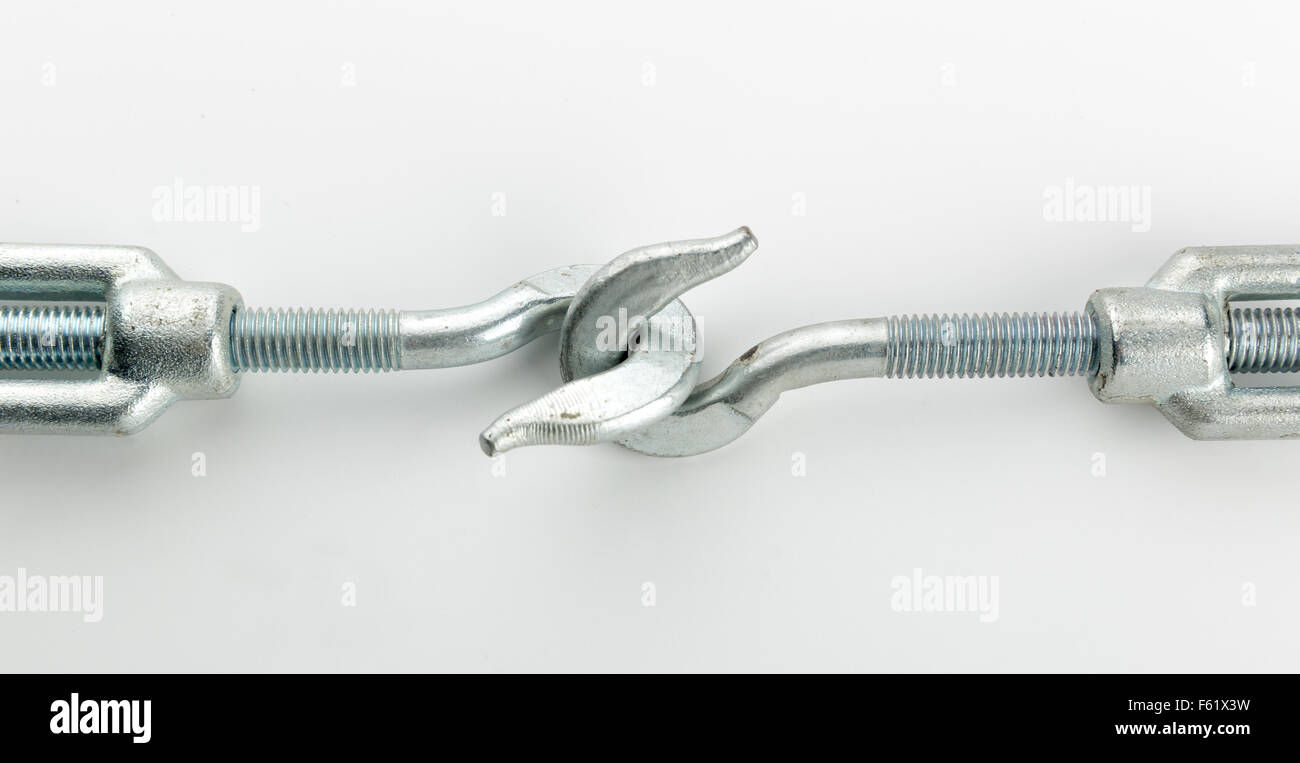 Two hooks connected on white Stock Photo - Alamy
