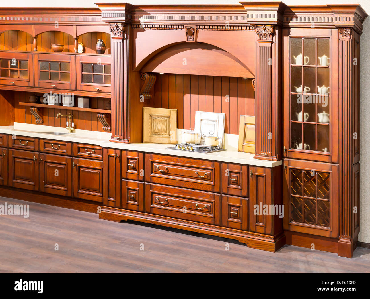 Modern spacious kitchen interior with wooden furniture Stock Photo - Alamy