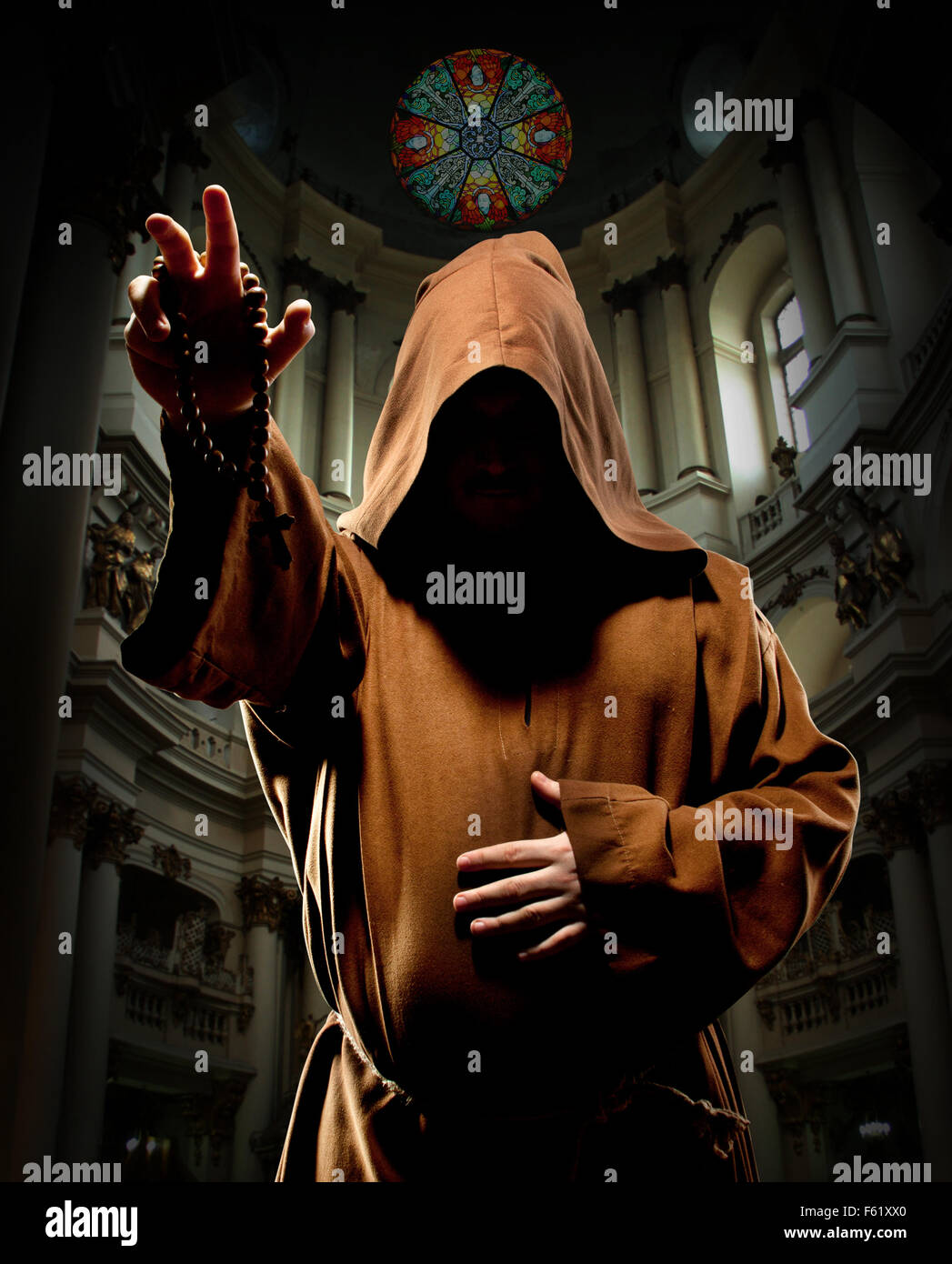 Portrait of preaching medieval monk in church Stock Photo - Alamy