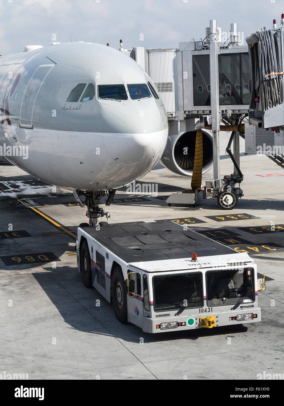 Qatar Airways plane in Doha International Airport Stock Photo - Alamy