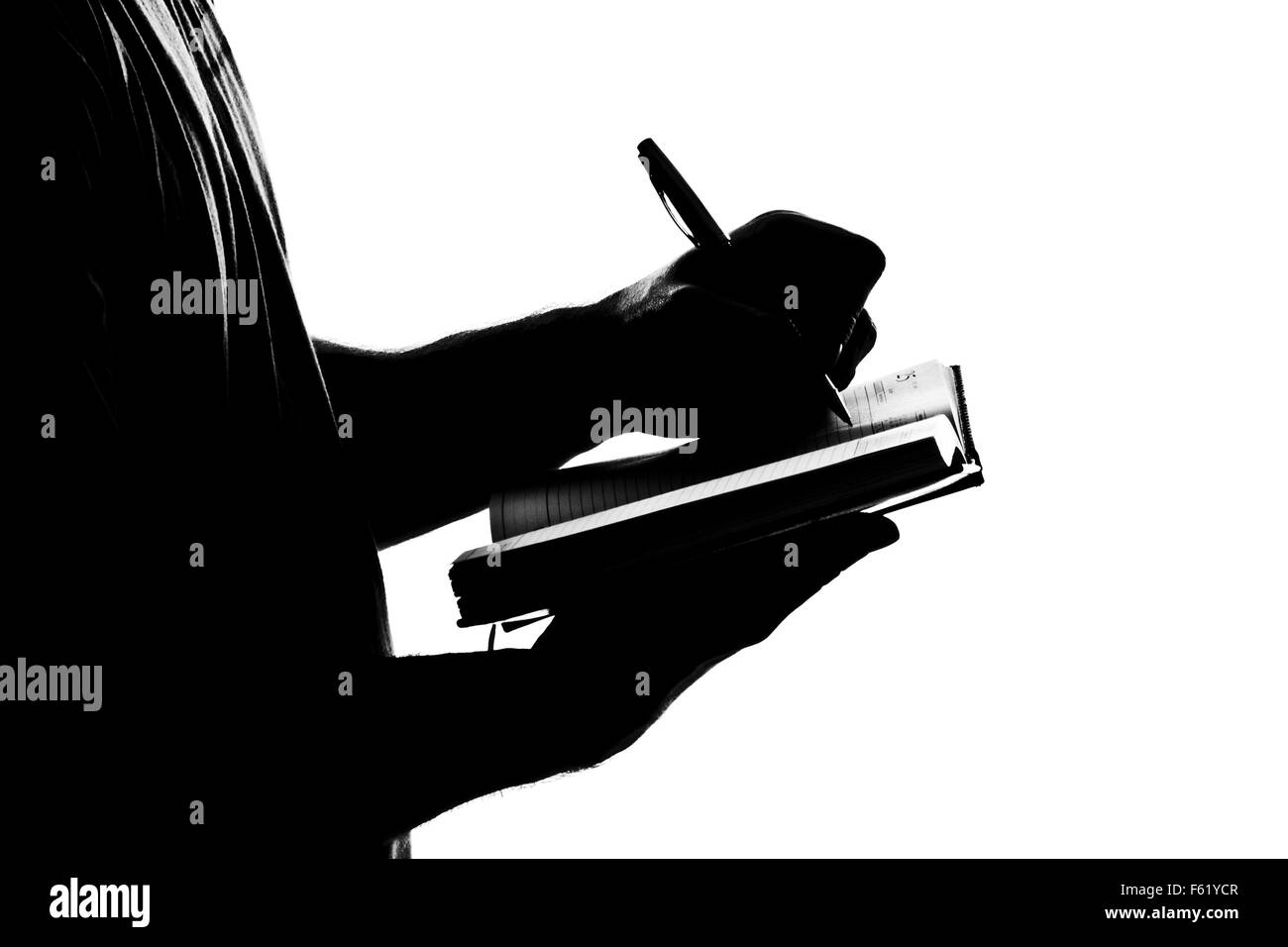 Silhouette of man writing business diary. Isolated on white Stock Photo ...