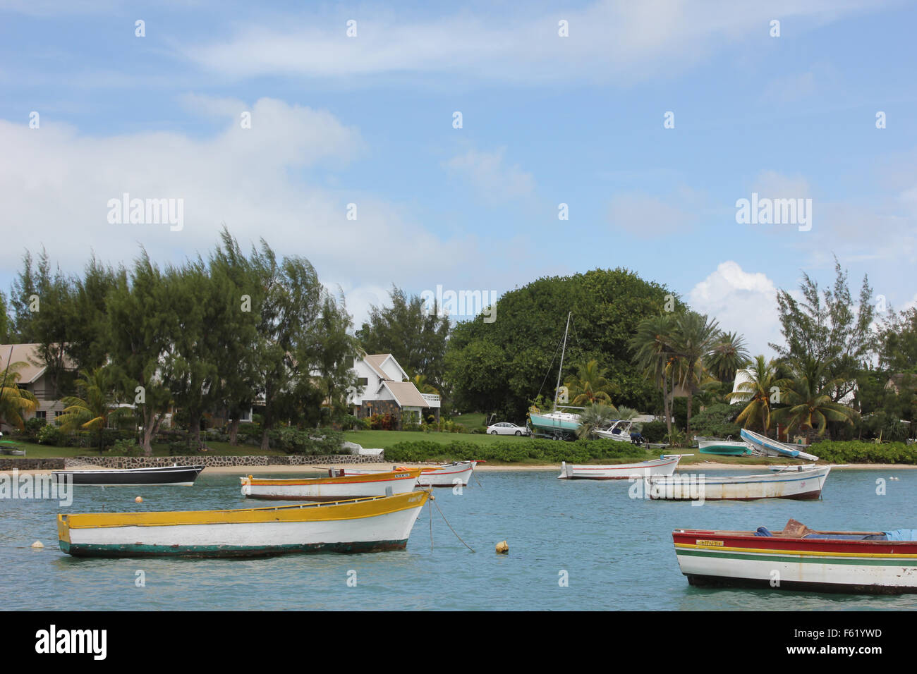 a group of boats floating on the sea Stock Photo - Alamy
