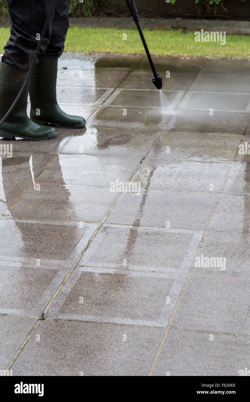 Outdoor floor cleaning with high pressure water jet Stock Photo - Alamy