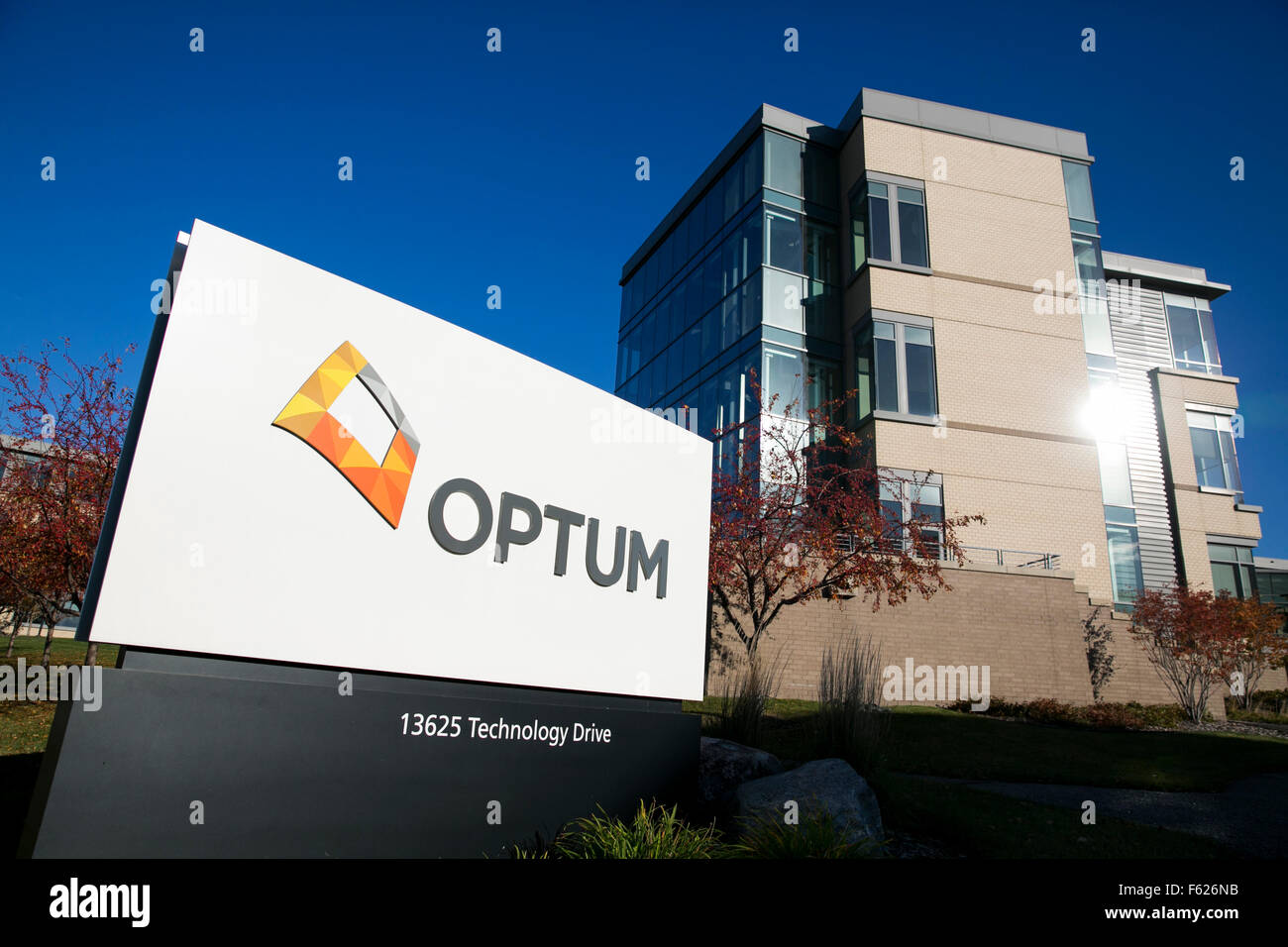 A logo sign outside of the headquarters of Optum in Eden Prairie ...