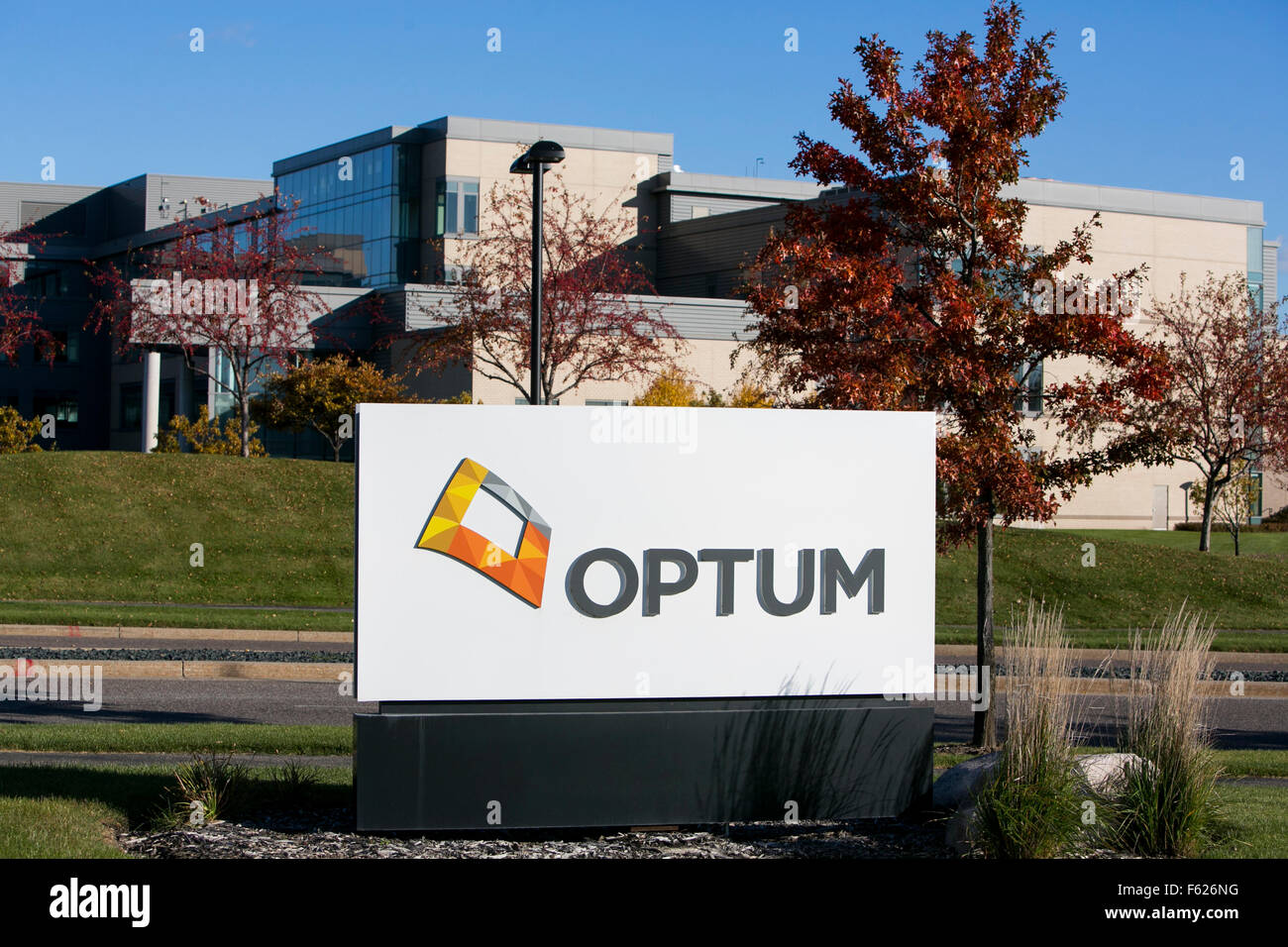 A logo sign outside of the headquarters of Optum in Eden Prairie ...