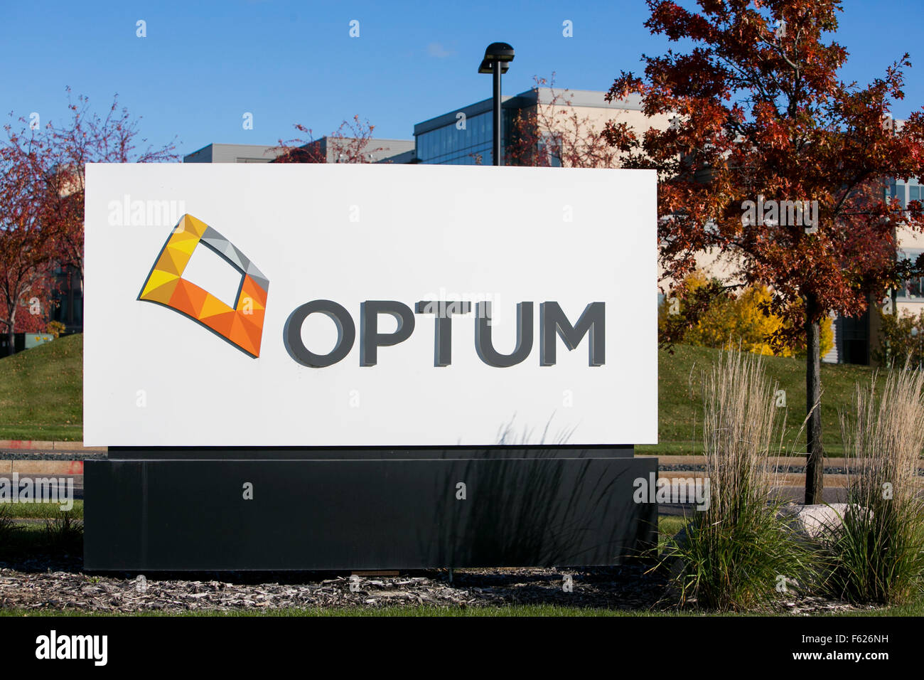 A logo sign outside of the headquarters of Optum in Eden Prairie ...