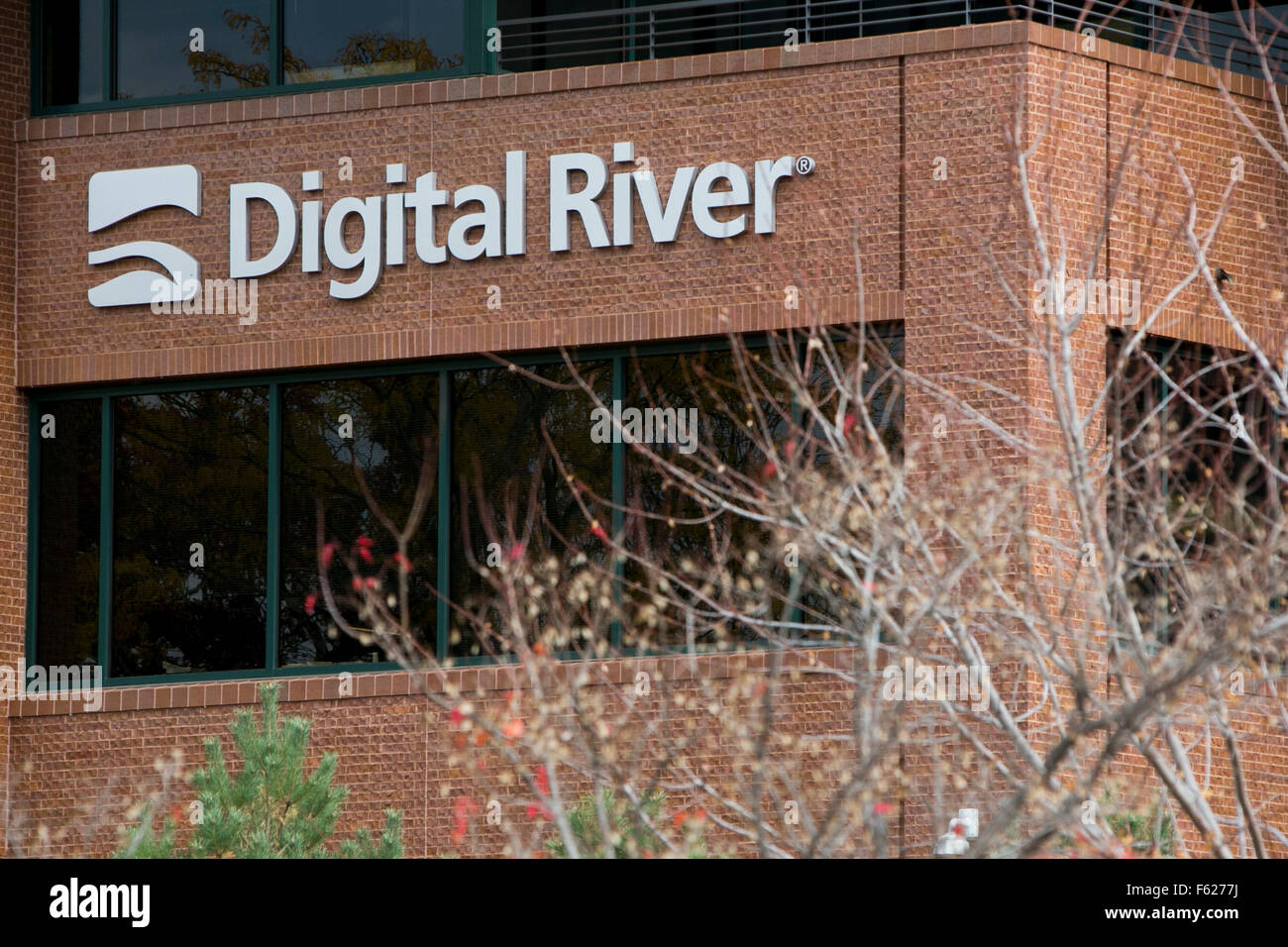 A logo sign outside of the headquarters of Digital River in Minnetonka ...