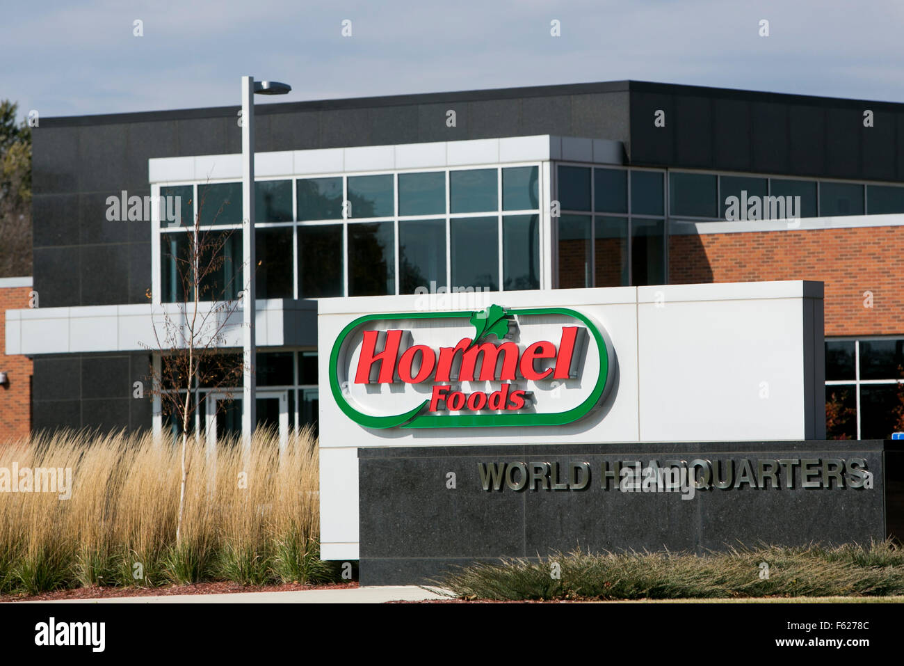 A logo sign outside of the headquarters of the Hormel Foods Corporation ...