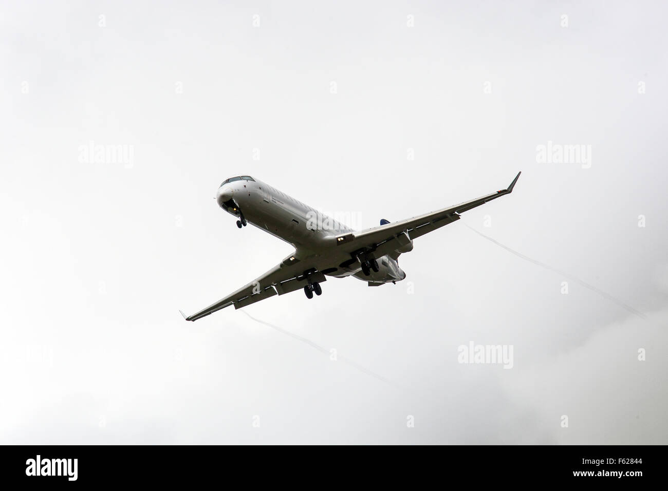A Plane on final approach to Manchester airport Stock Photo - Alamy