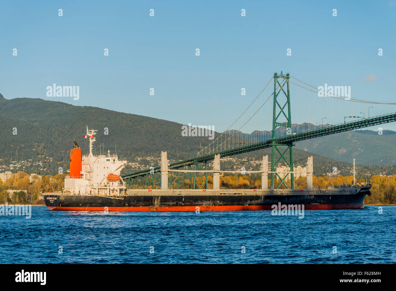 General Cargo ship, Octbreeze Island, passes under Lions Gate Bridge ...